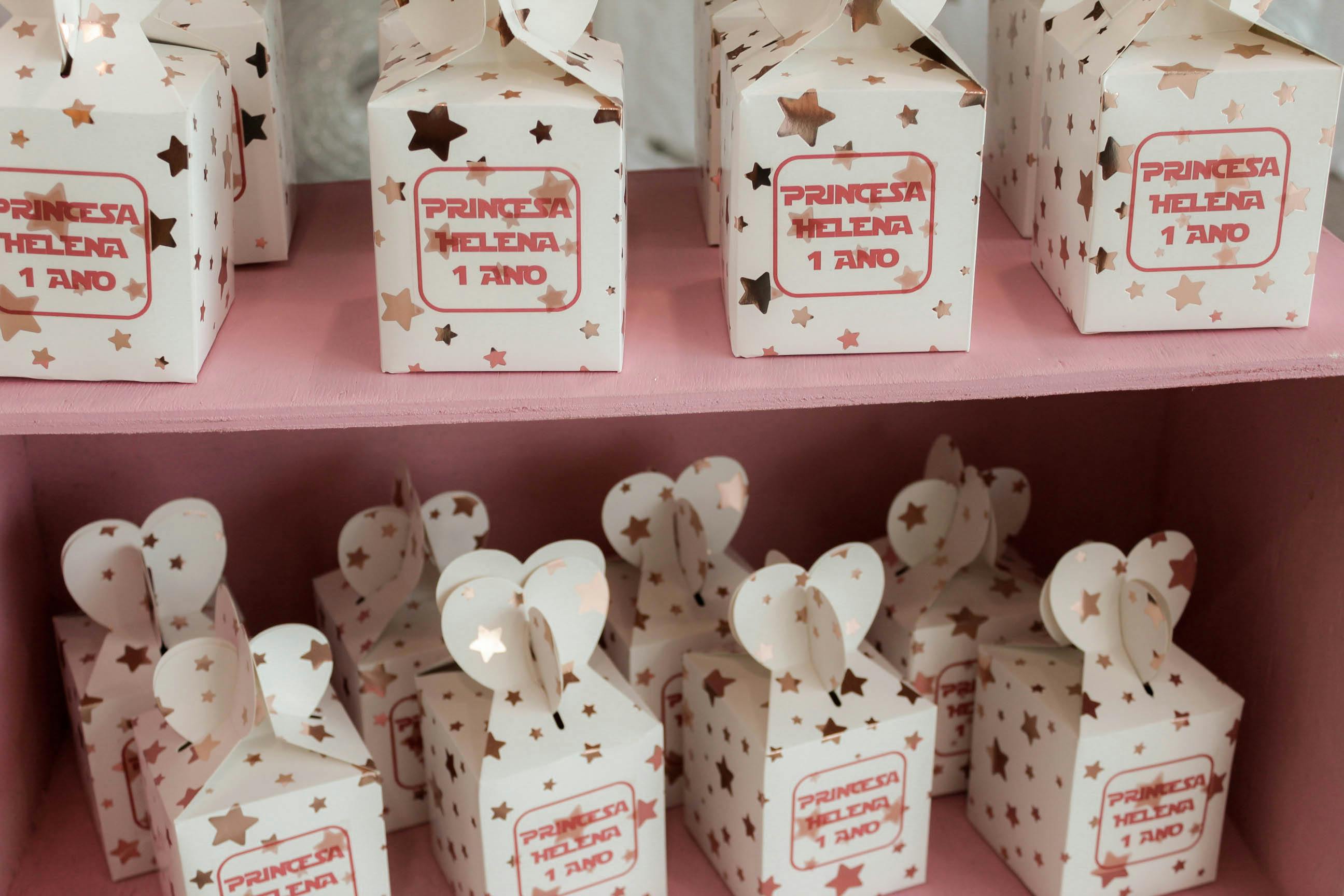 White Cardboard Boxes with Printed Stars · Free Stock Photo