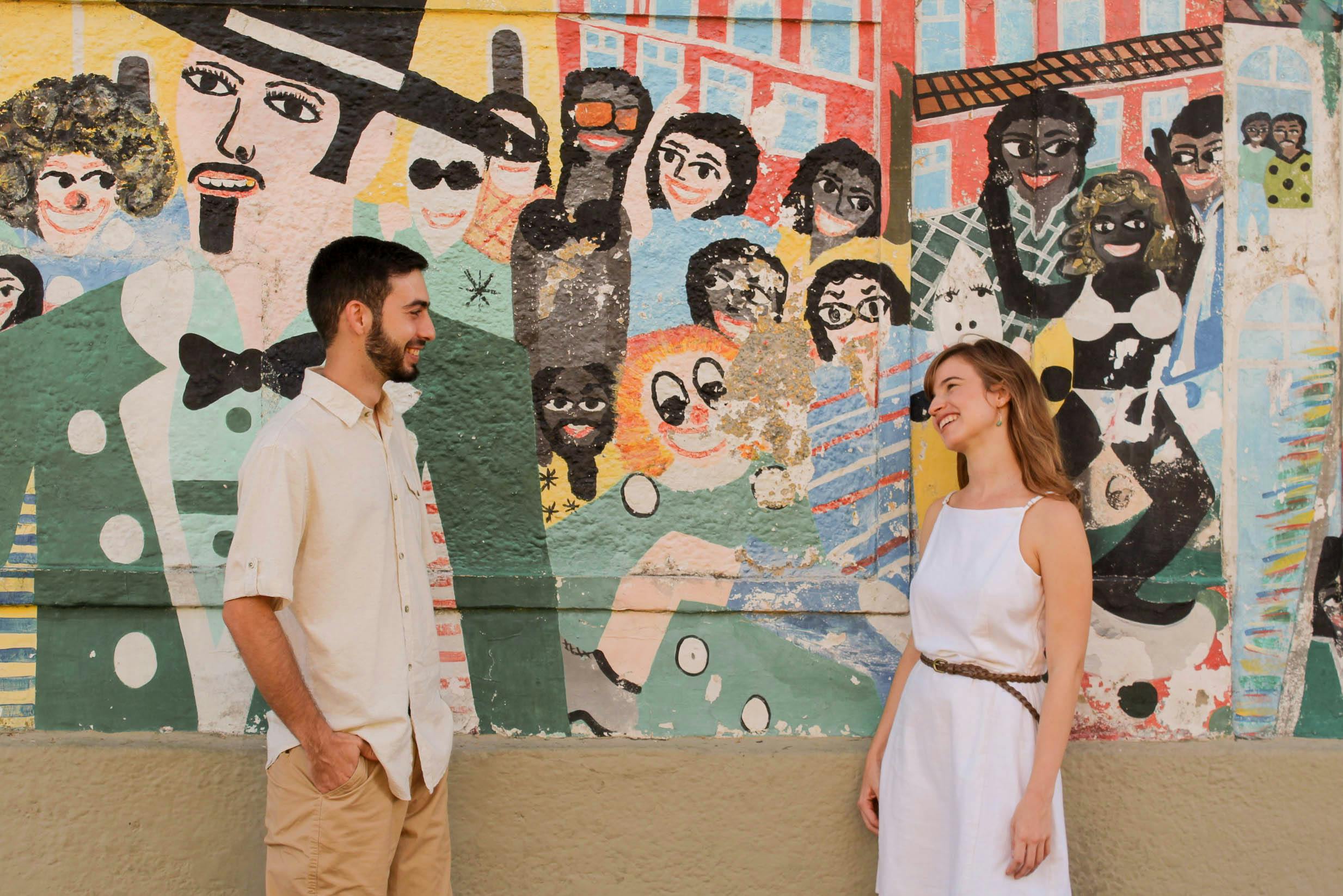 A Couple Walking Side by Side on the Beach Shore · Free Stock Photo