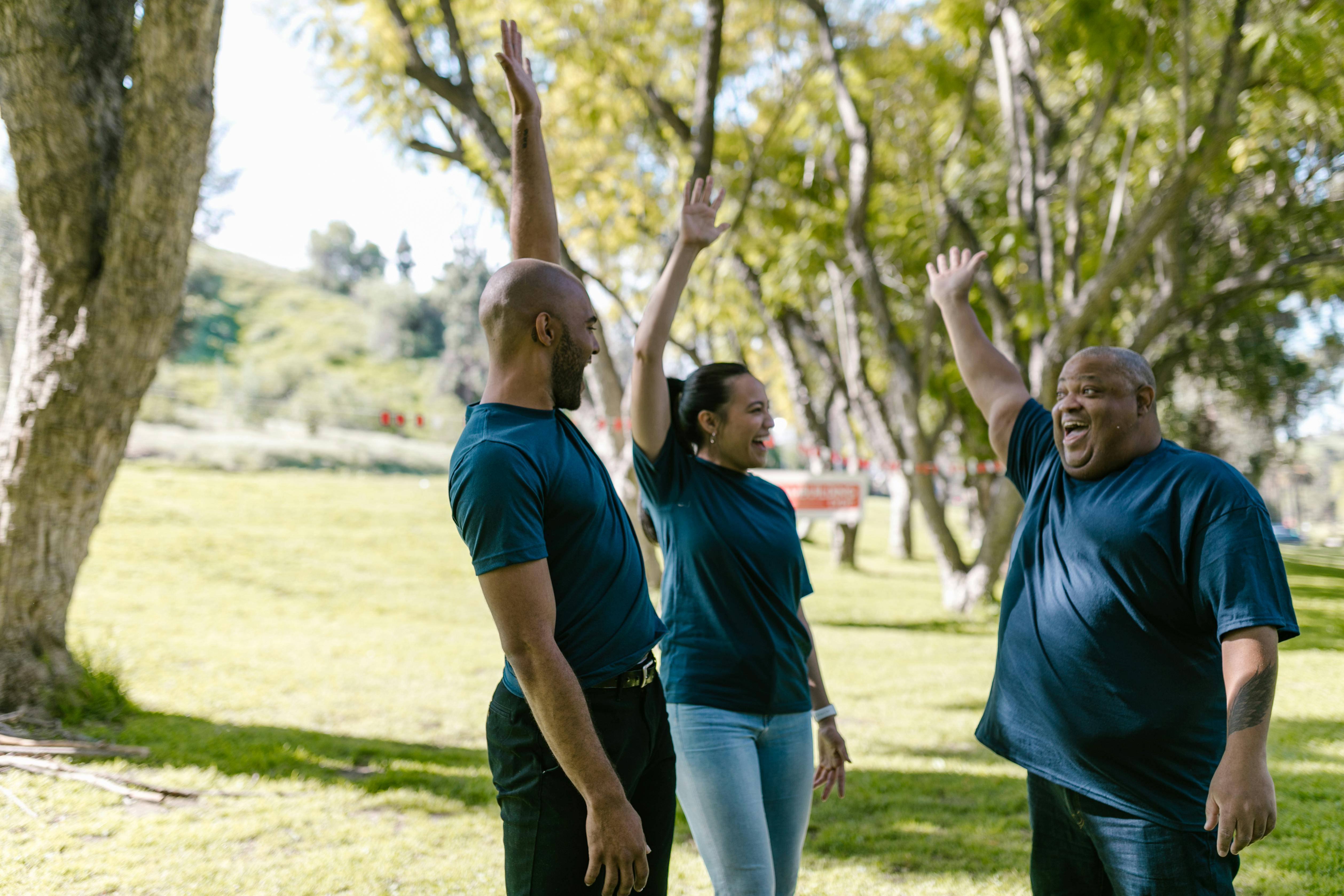 Photo of People Raising Their Hands Up · Free Stock Photo