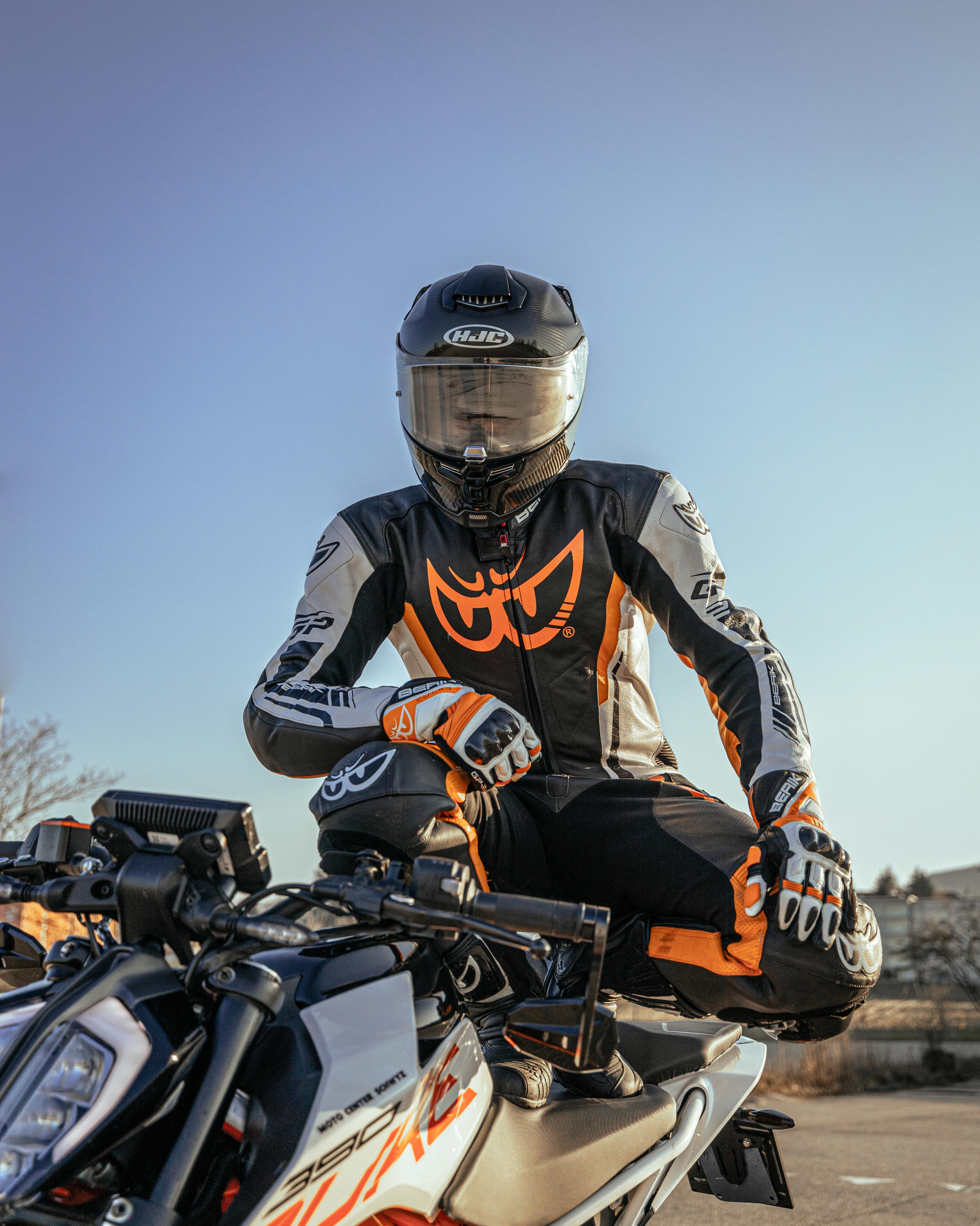 Person Ride a Ducati Motorcycle · Free Stock Photo