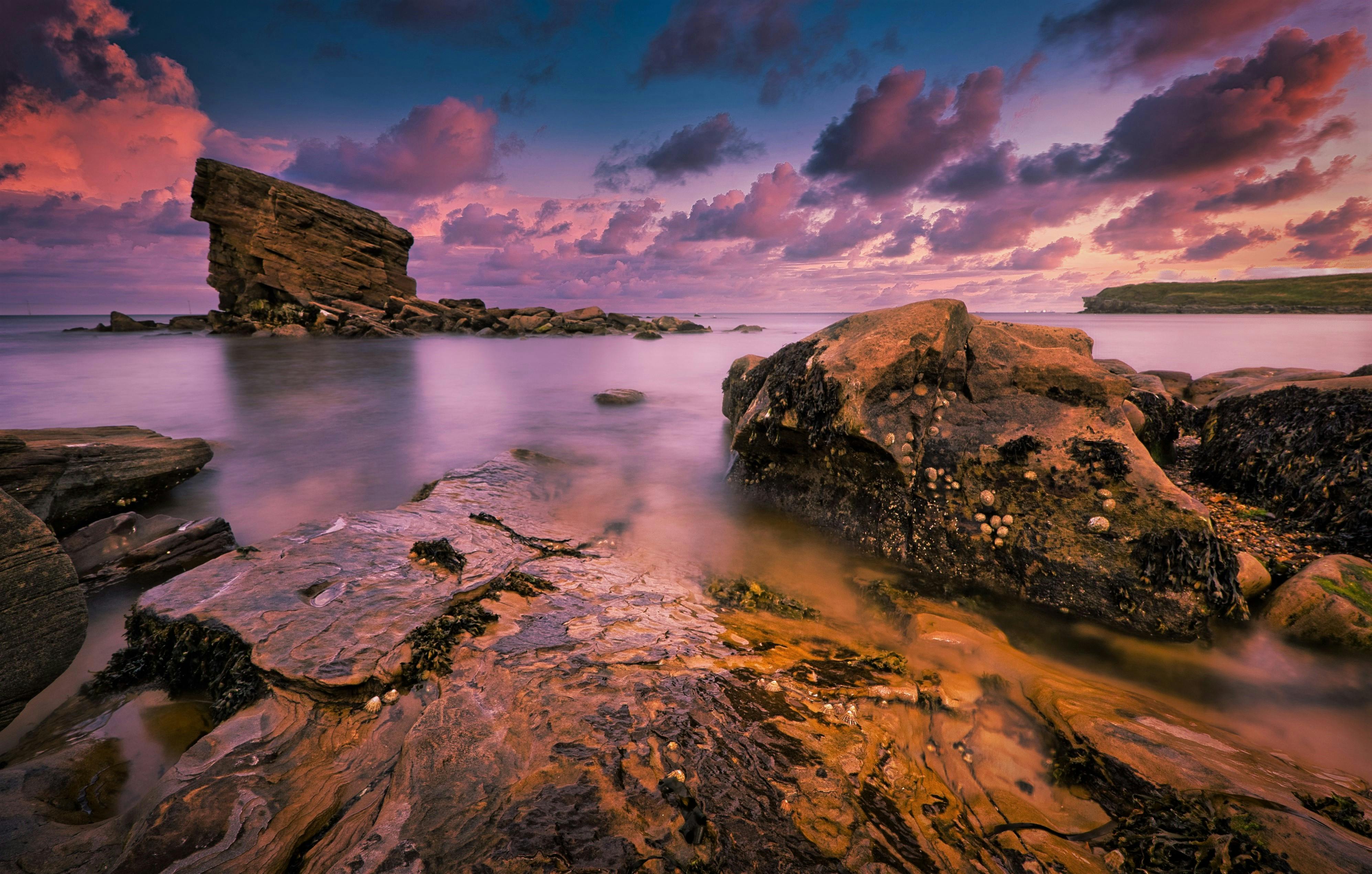 Rock Formations on a Seacoast · Free Stock Photo