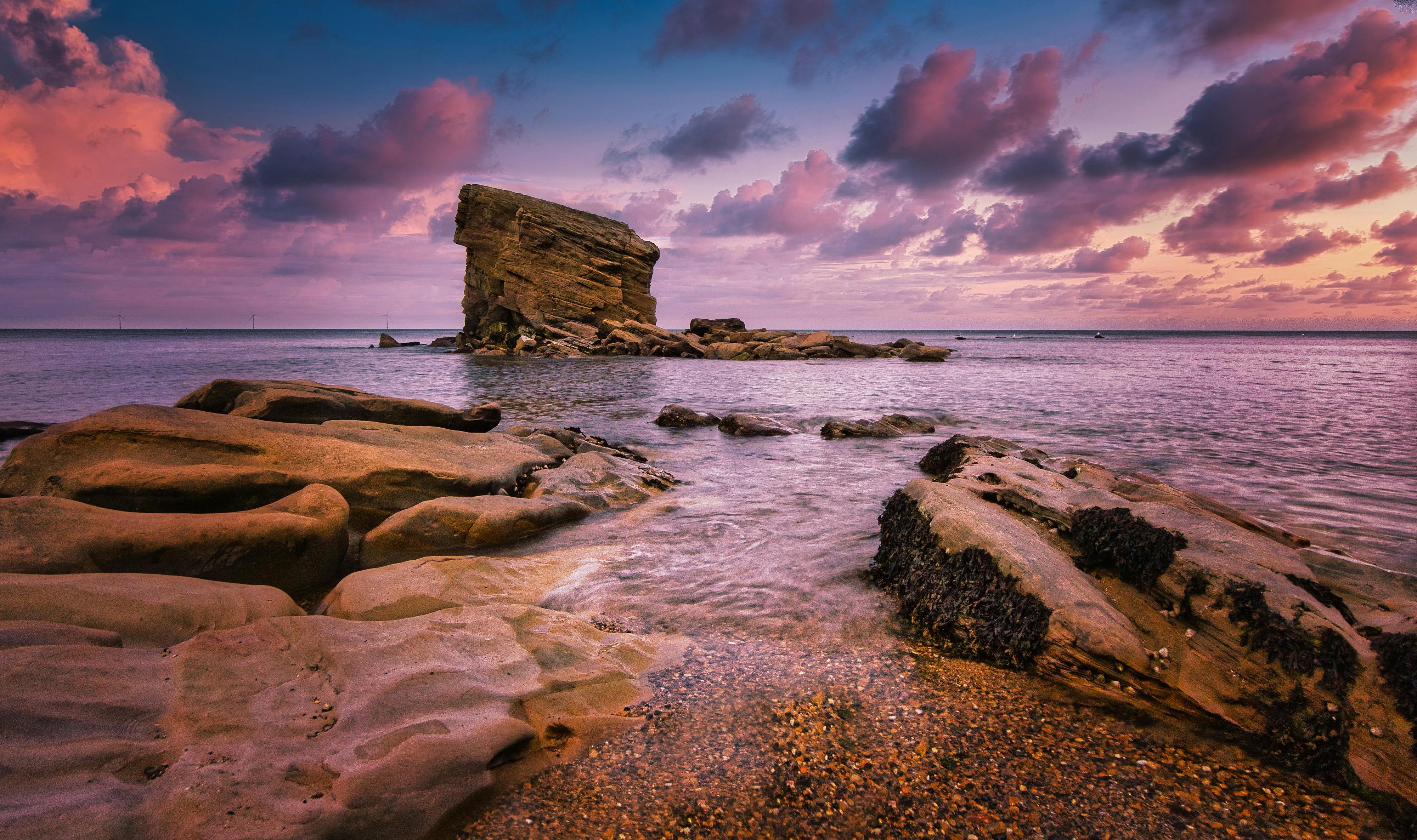 Scenic Seacoast at Sunset · Free Stock Photo