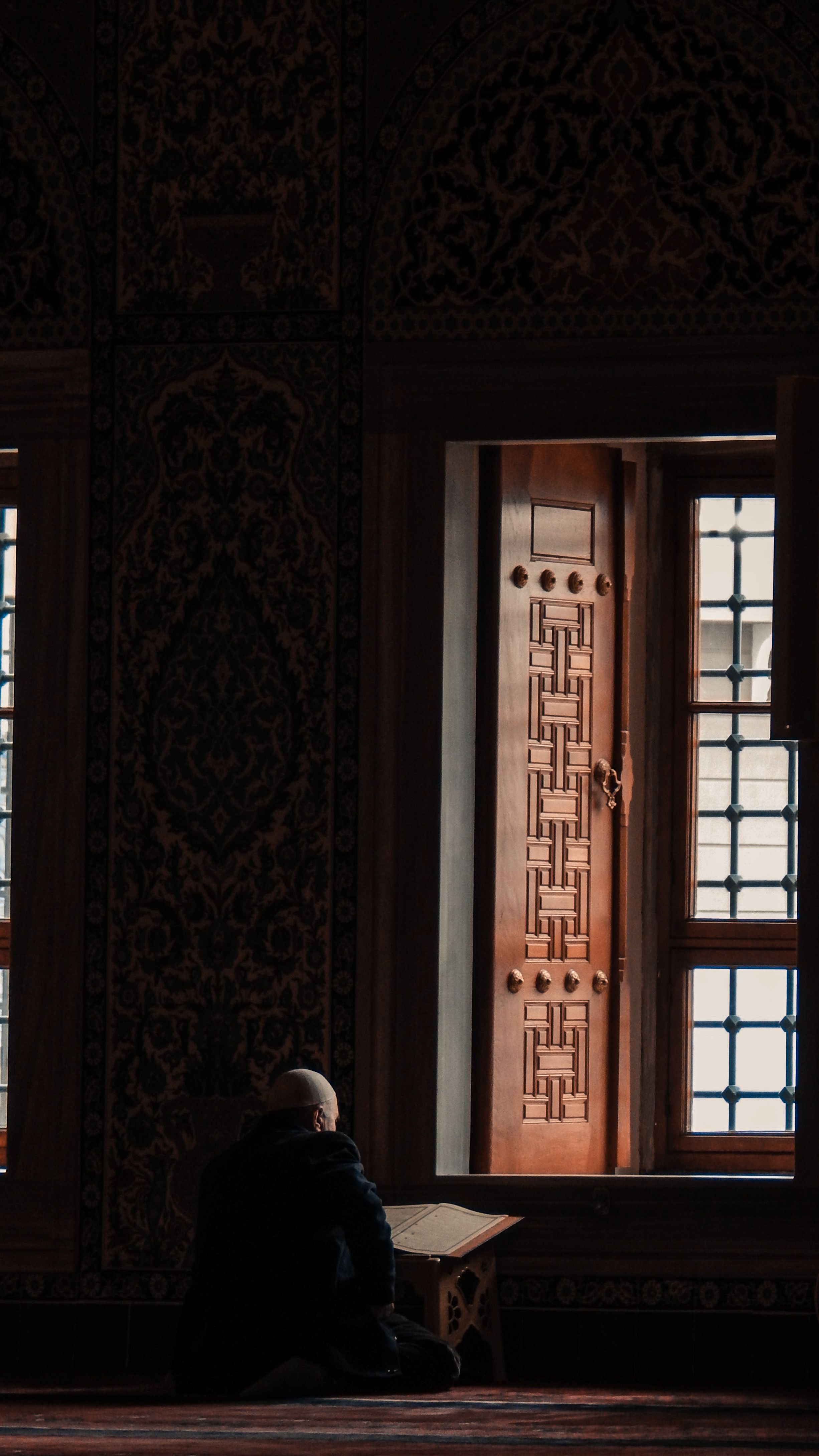Man Praying in front of the Window · Free Stock Photo