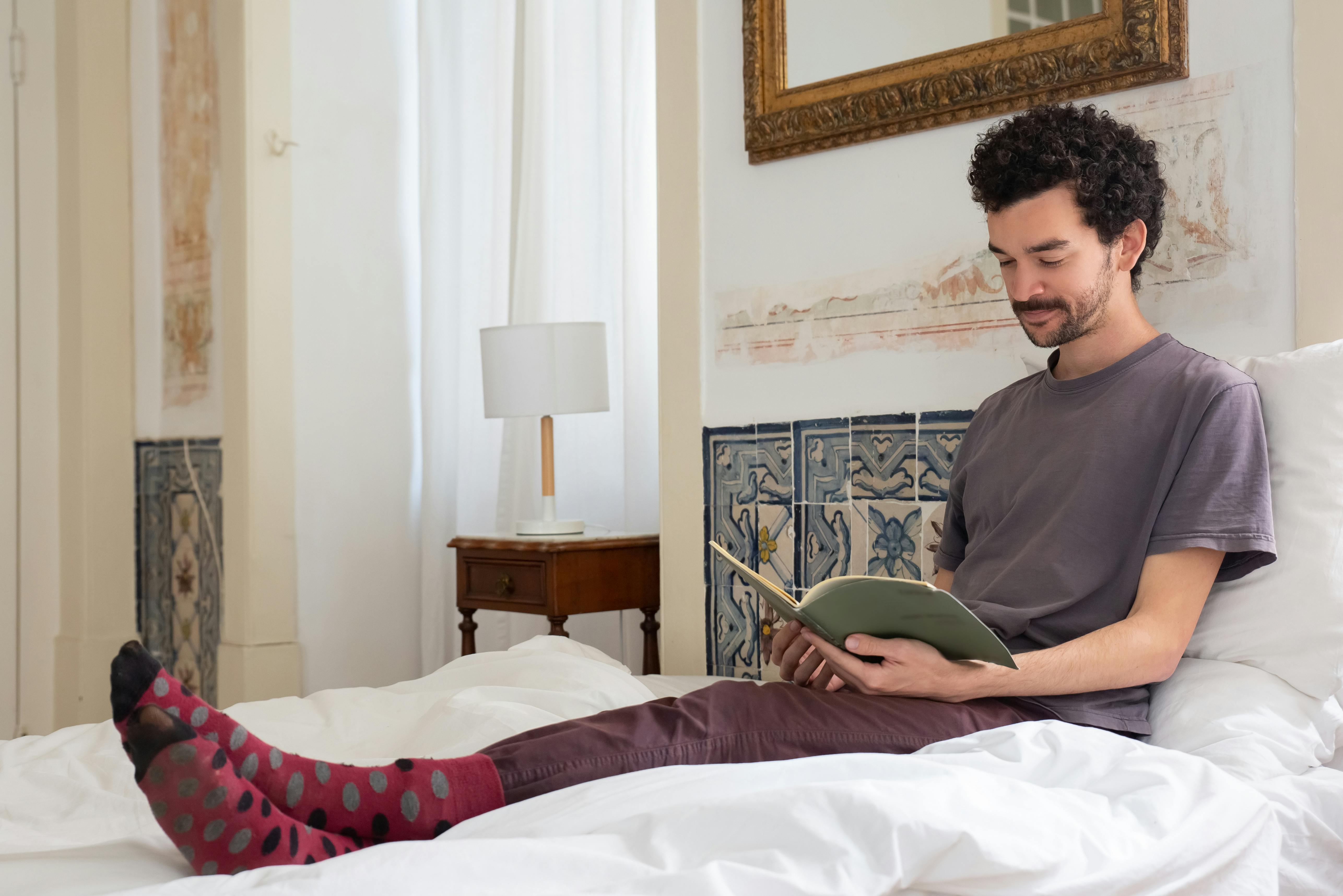 A Man Reading a Book · Free Stock Photo