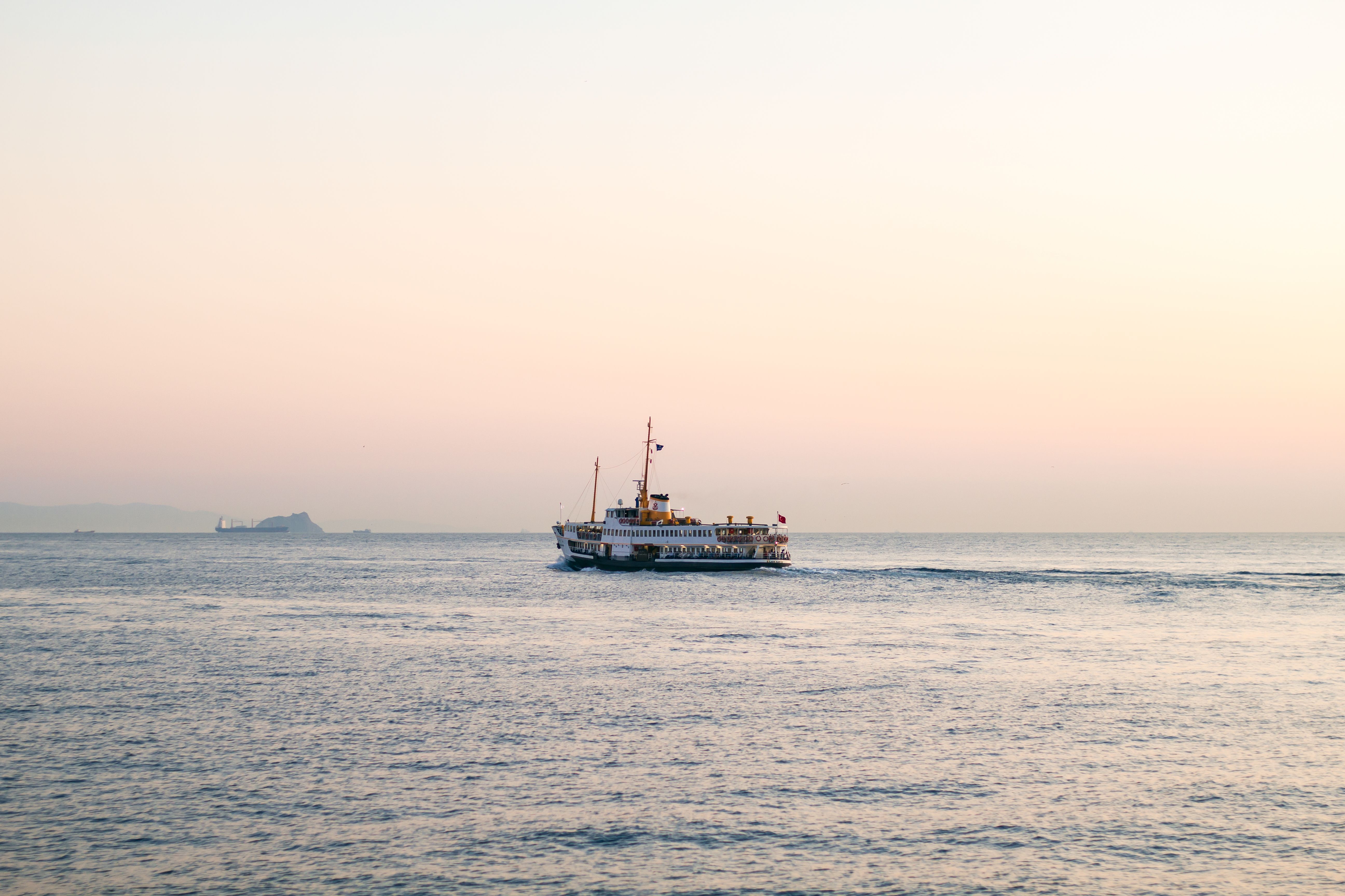 Ship floating on rippling water · Free Stock Photo