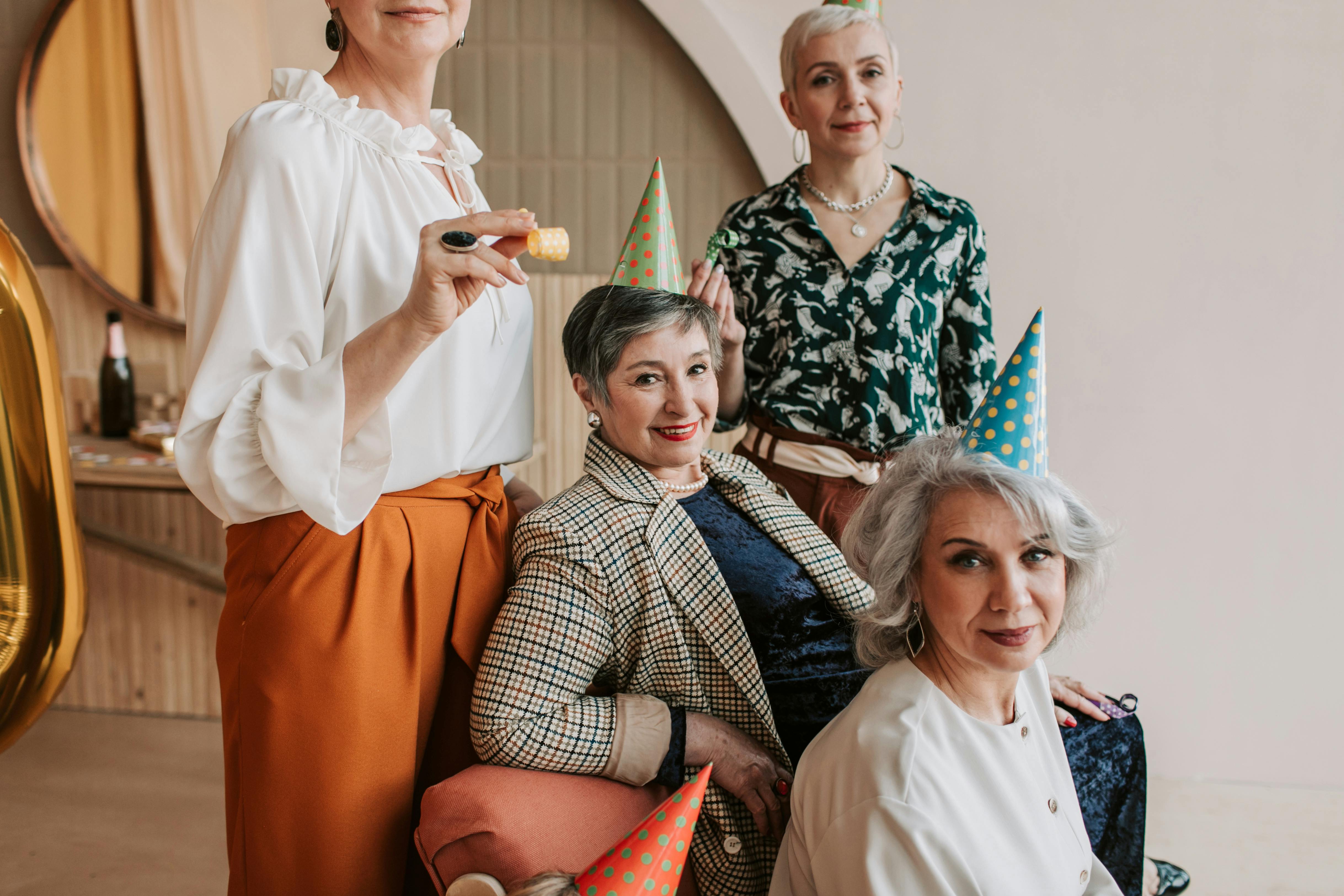 Elderly Women Wearing Party Hats · Free Stock Photo