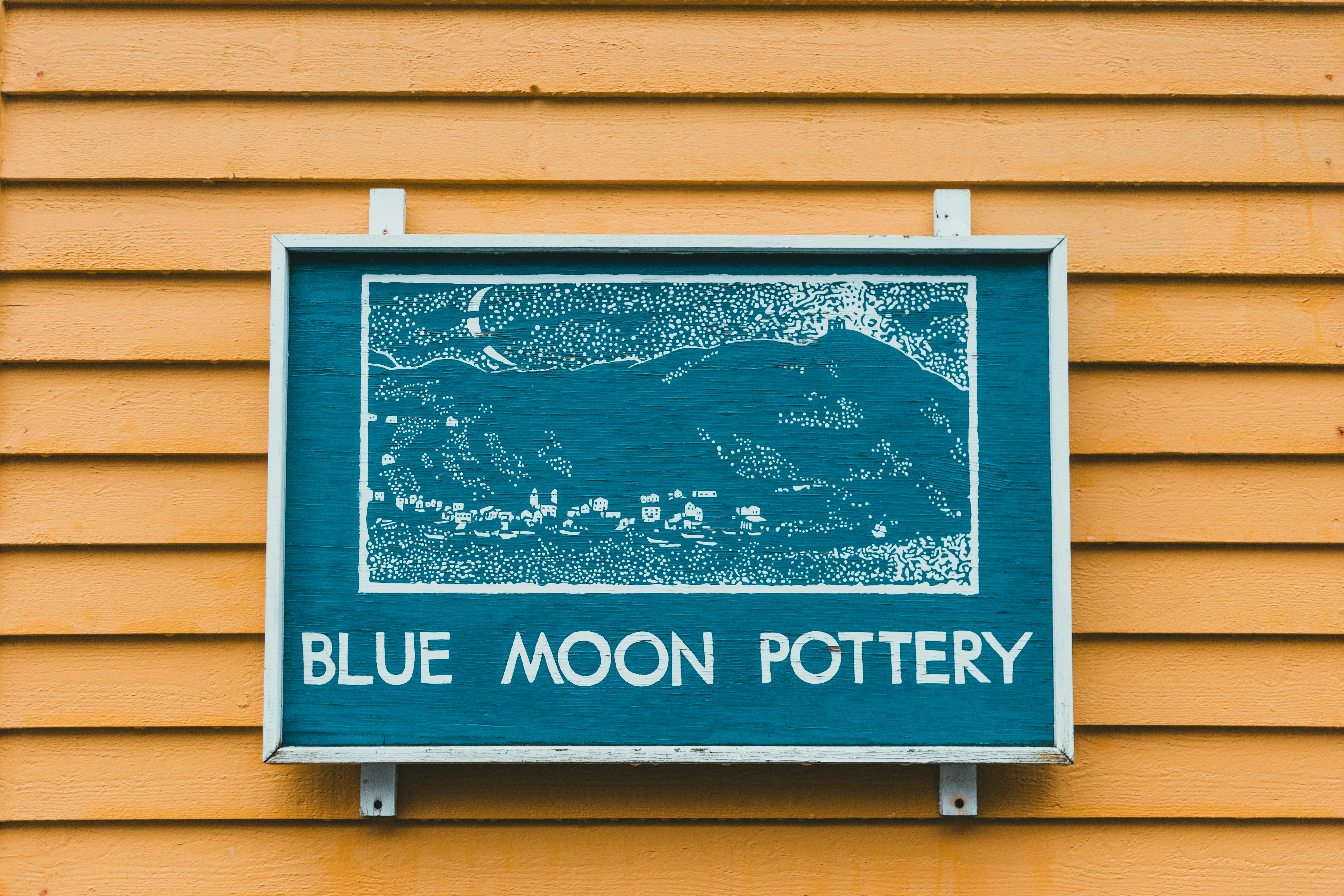 Signboard with inscription on wall of pottery · Free Stock Photo