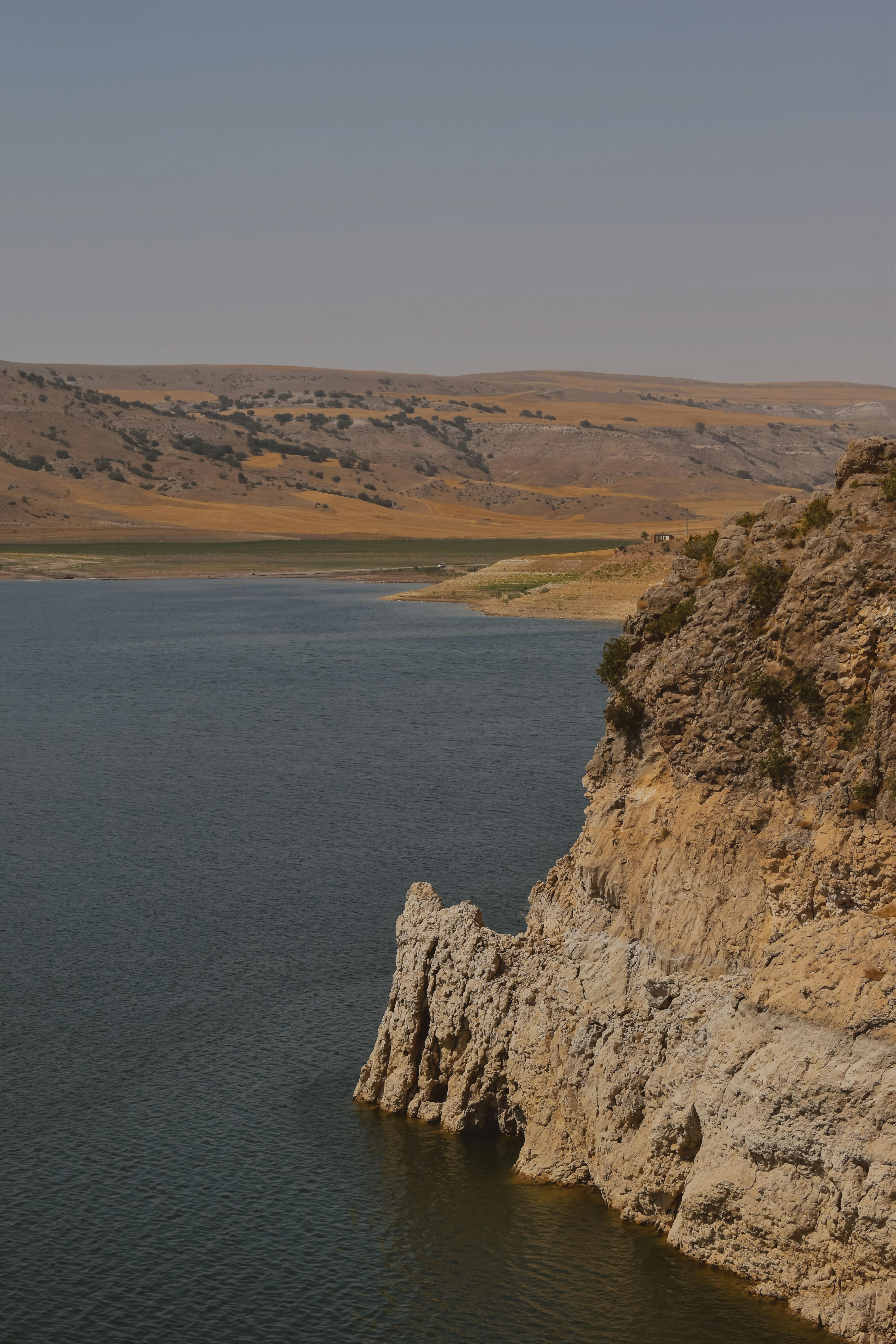 Rock Cliff in Sea in Nature Landscape · Free Stock Photo