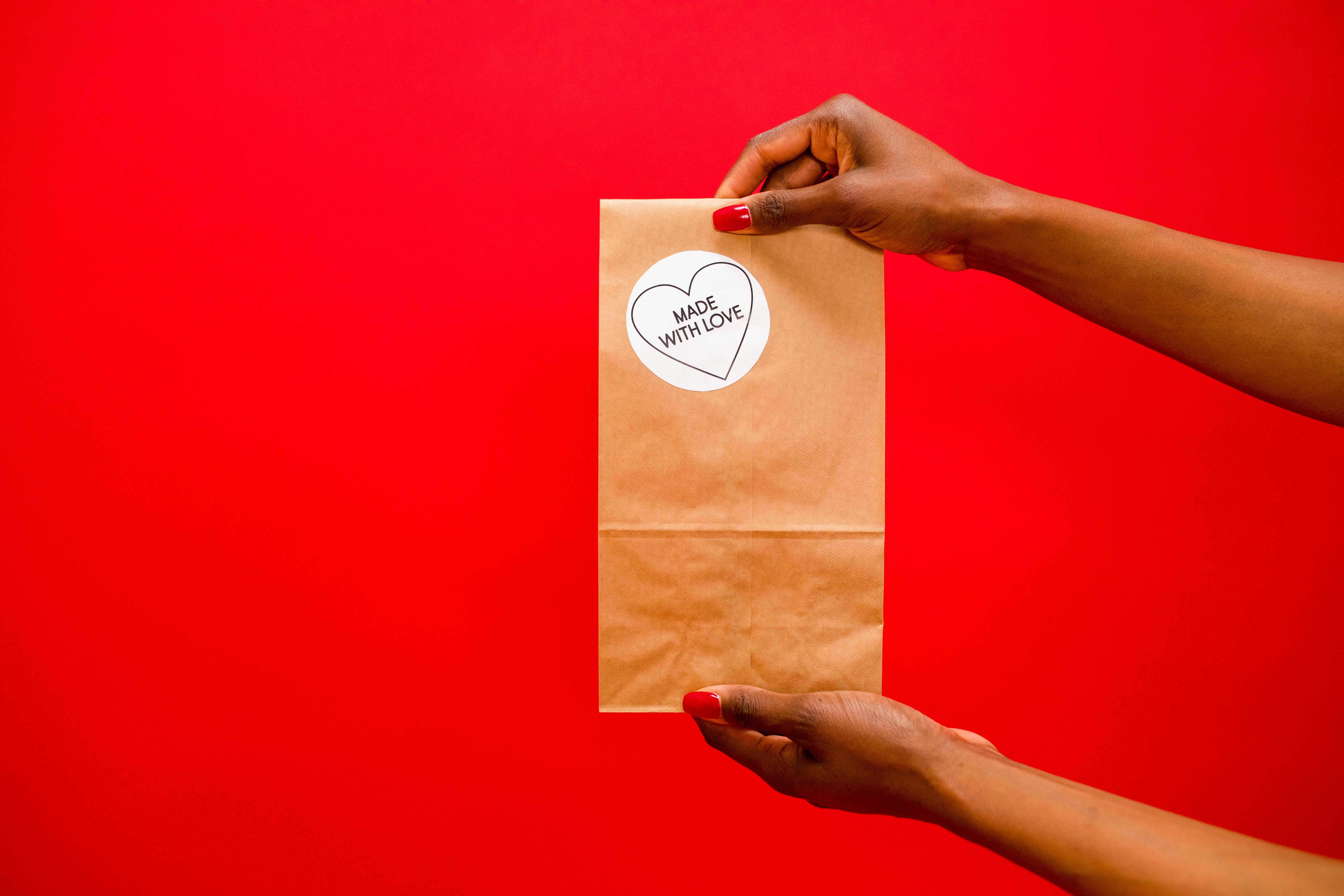 A Person Holding a Paper Bag · Free Stock Photo