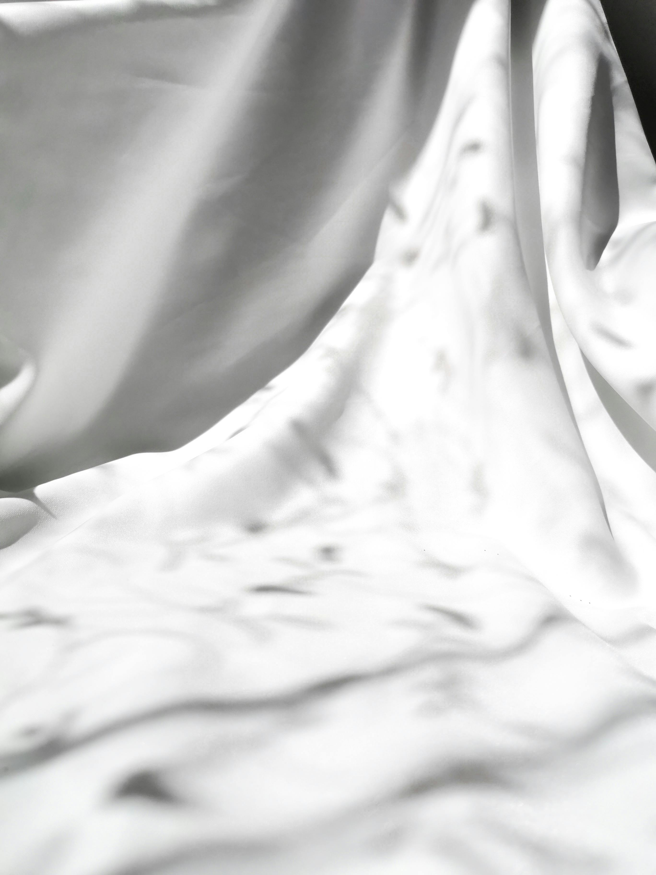 A Grayscale of a Fabric · Free Stock Photo