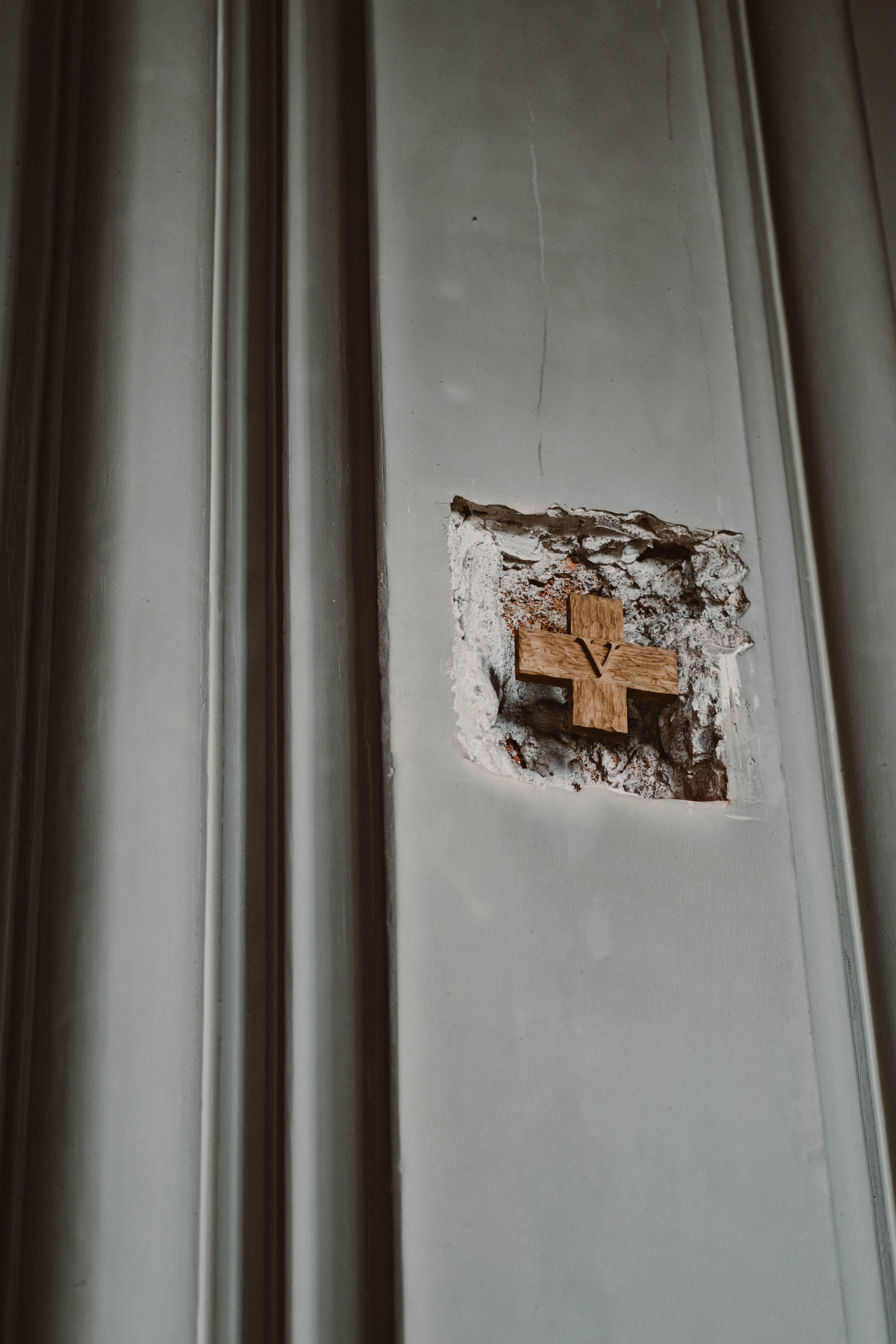 Wooden Cross on Wall · Free Stock Photo