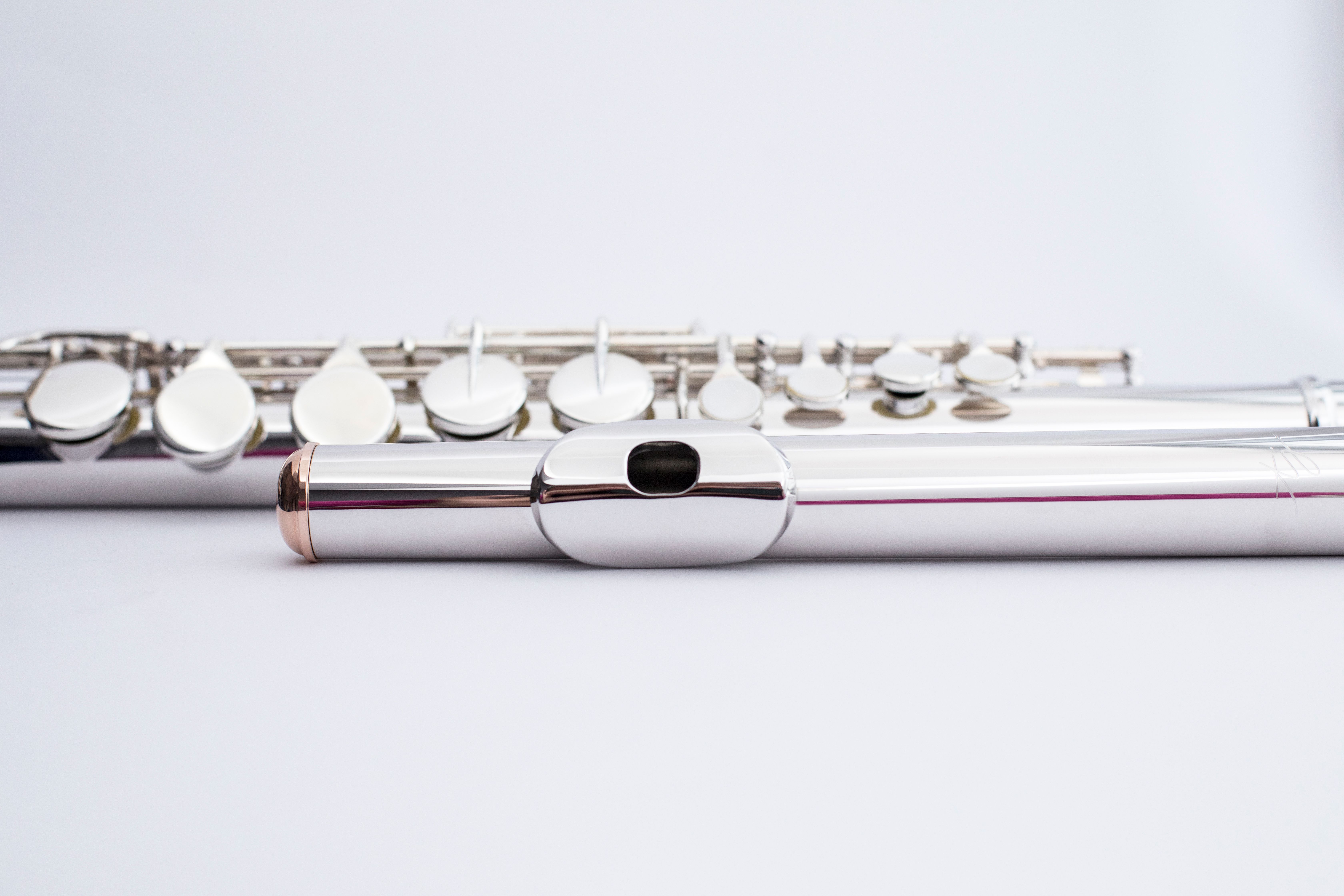 Brown Wooden Flute on Book With Notes · Free Stock Photo
