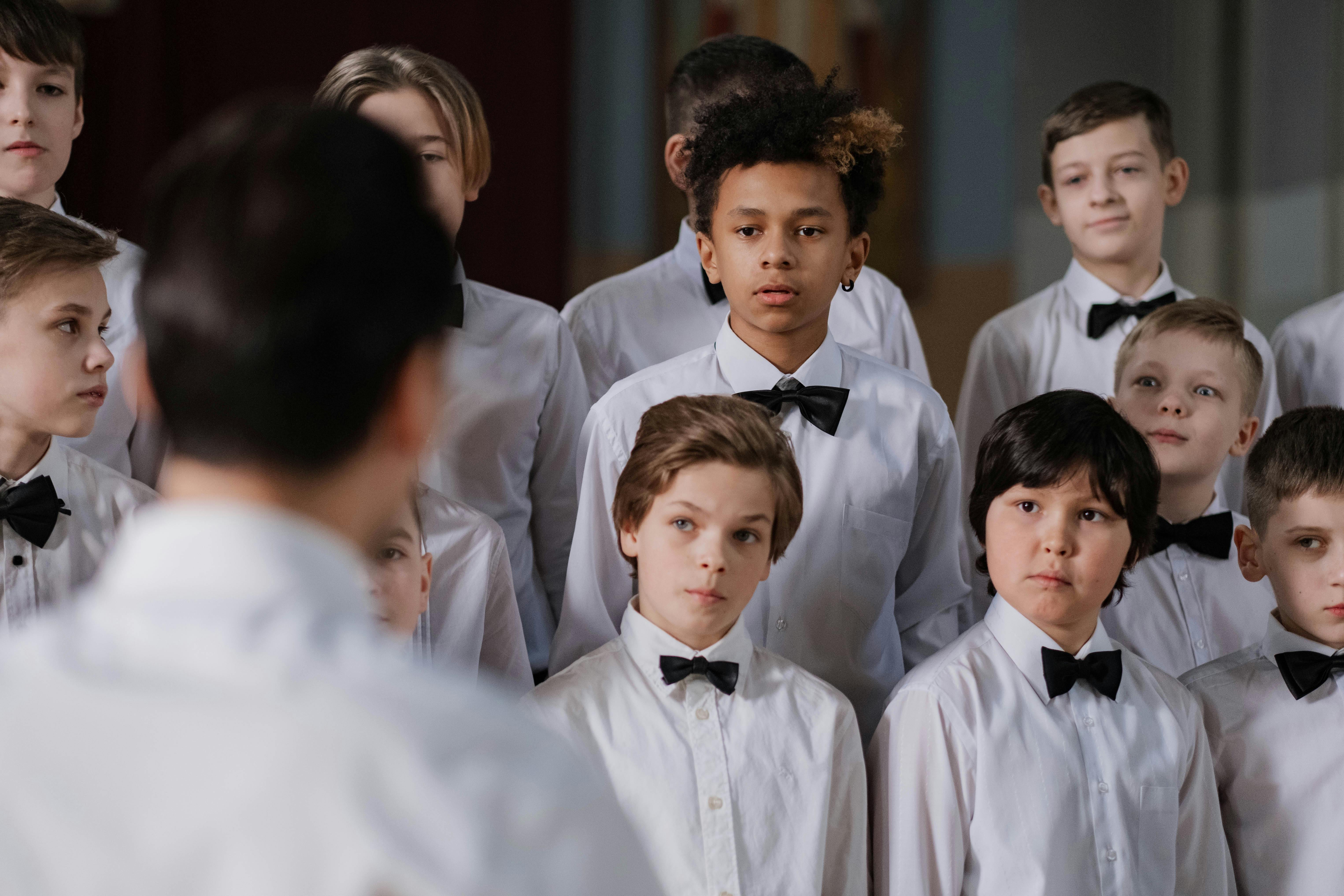 Boys Wearing White Long Sleeves and Bowtie as Choir Uniform · Free ...