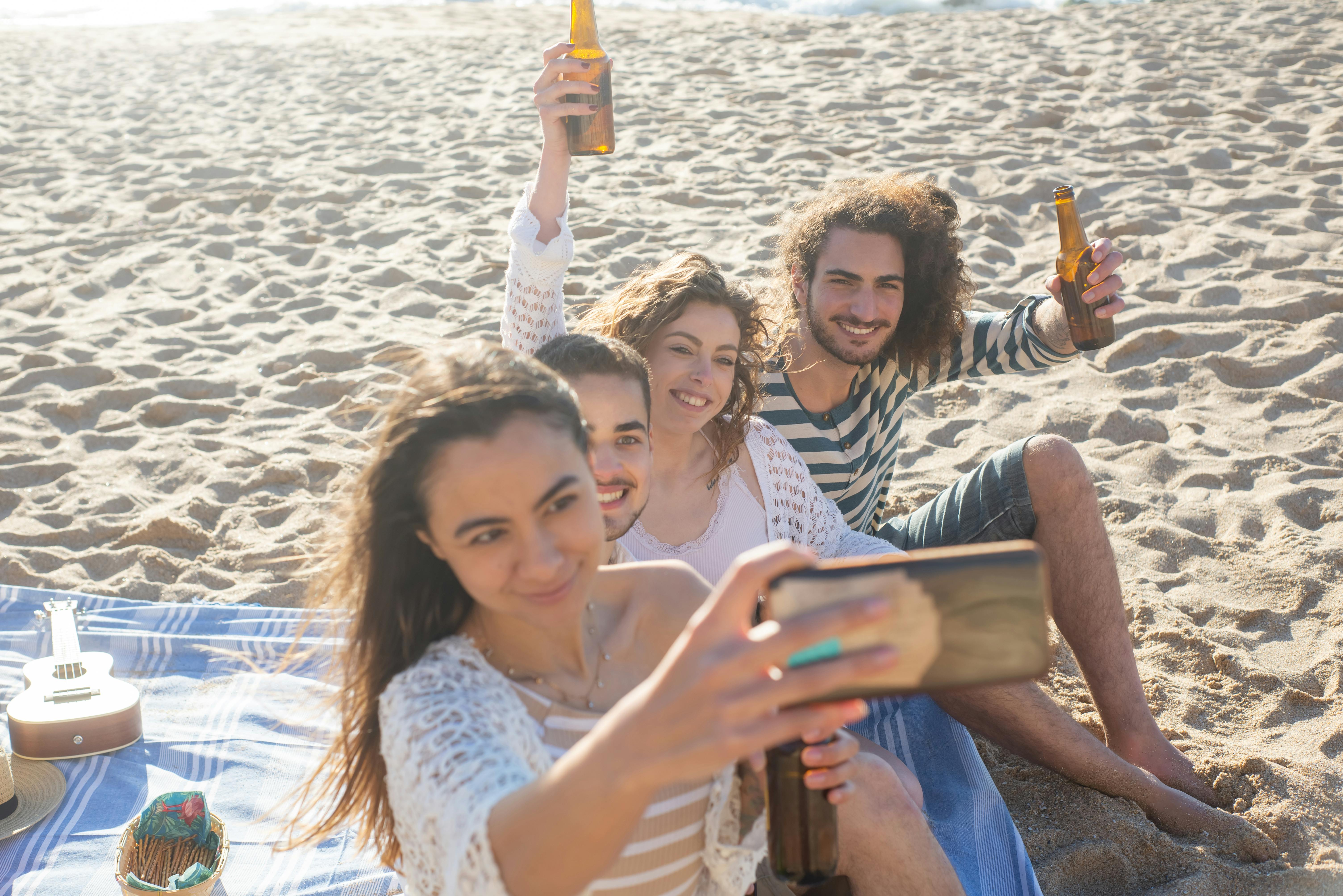 Couples Taking a Groupfie at the Beach · Free Stock Photo