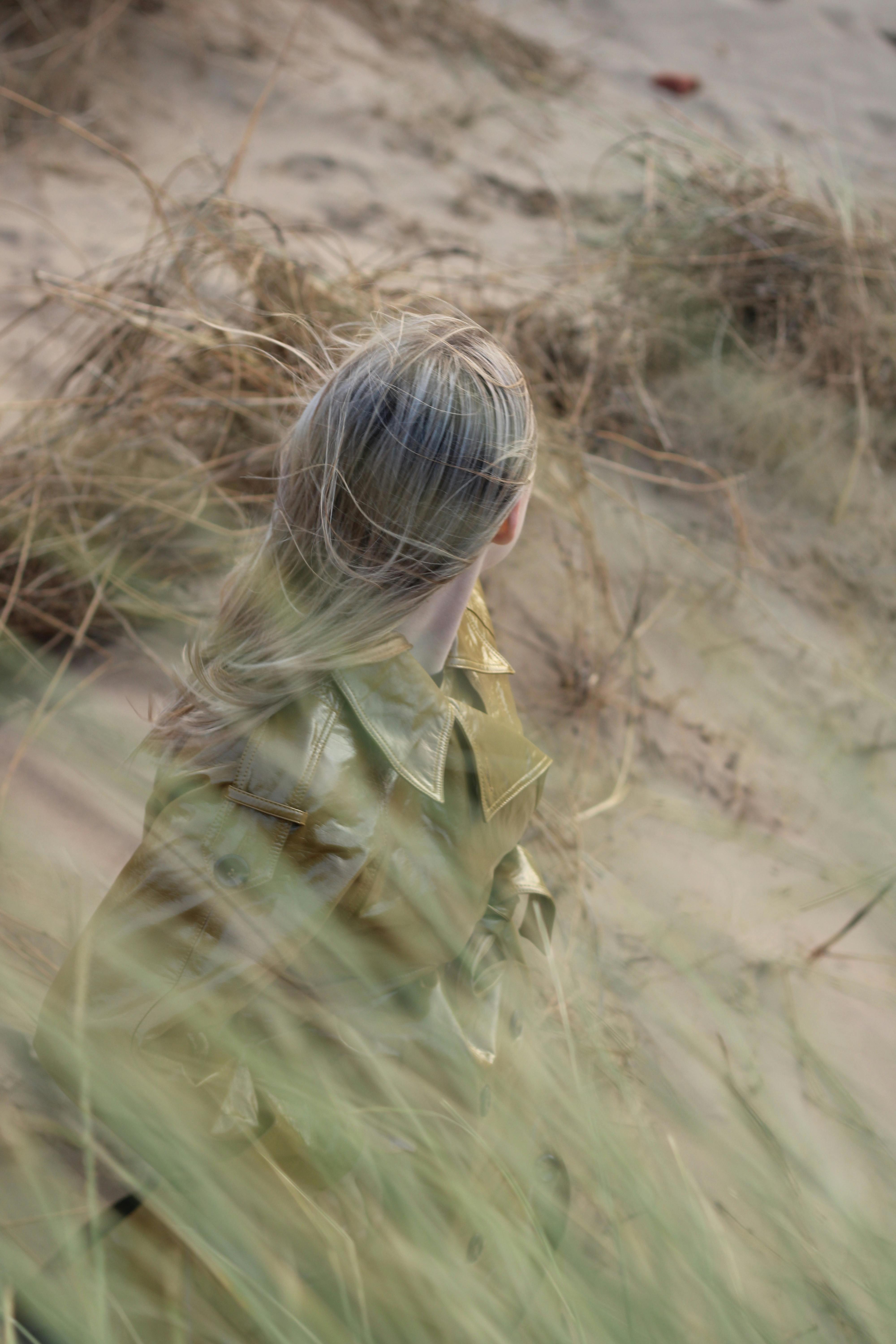 High Angle Shot of Blonde Person Looking Afar · Free Stock Photo