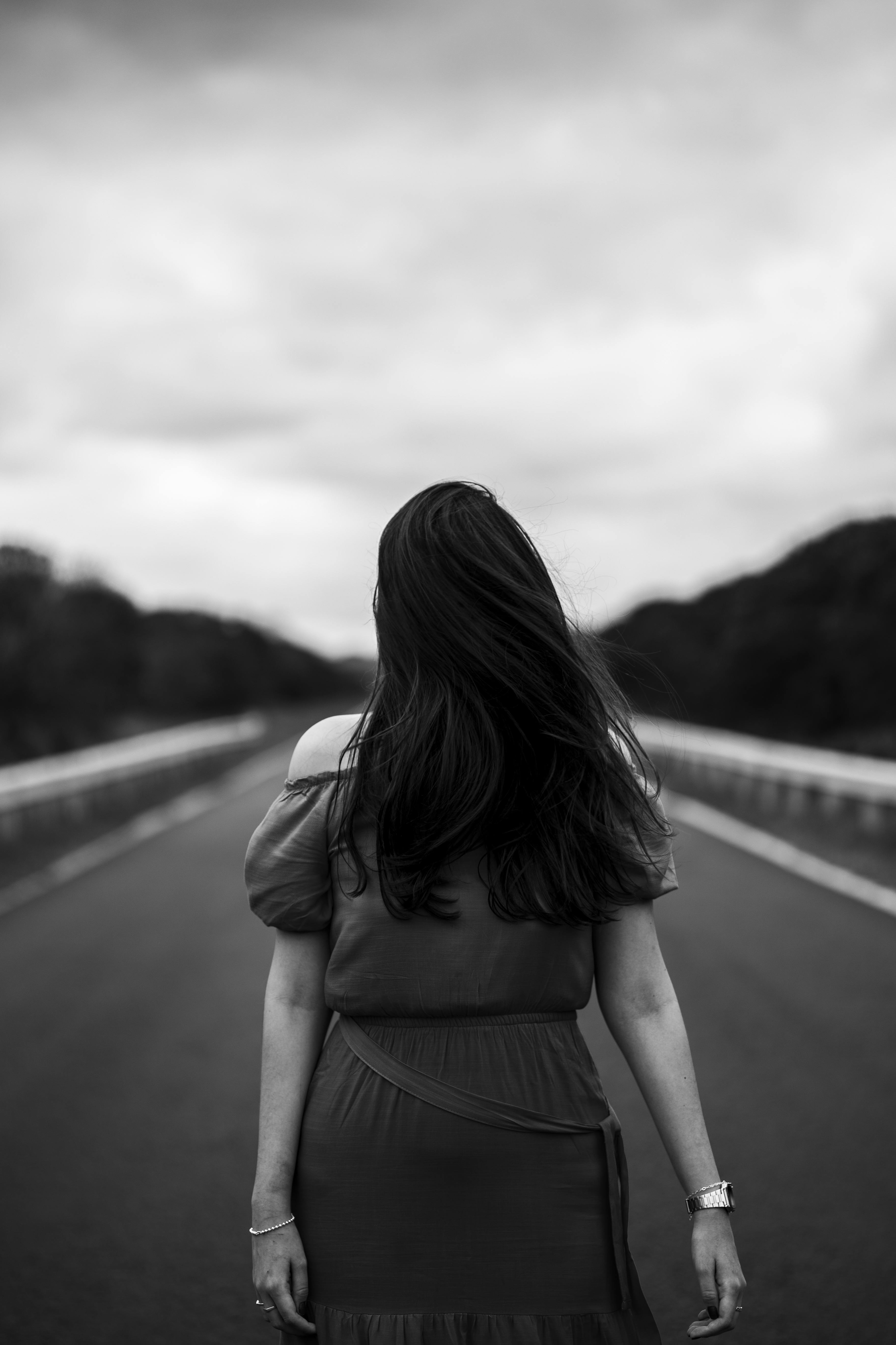 Grayscale Photo of Woman with Hair Covering Face · Free Stock Photo
