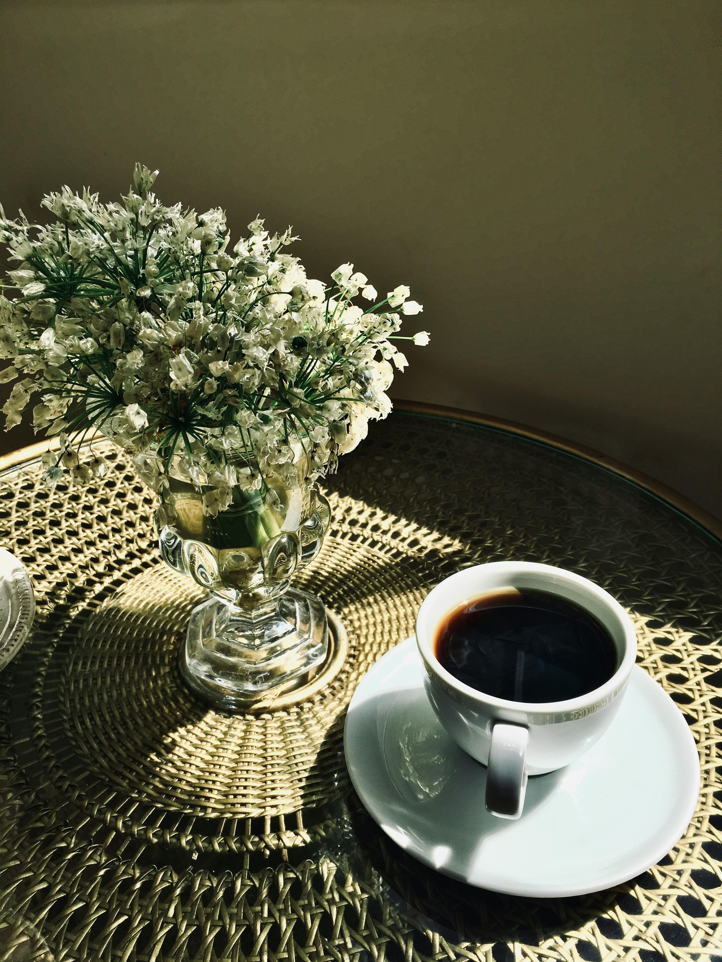 Cup of Coffee on a Round Table · Free Stock Photo