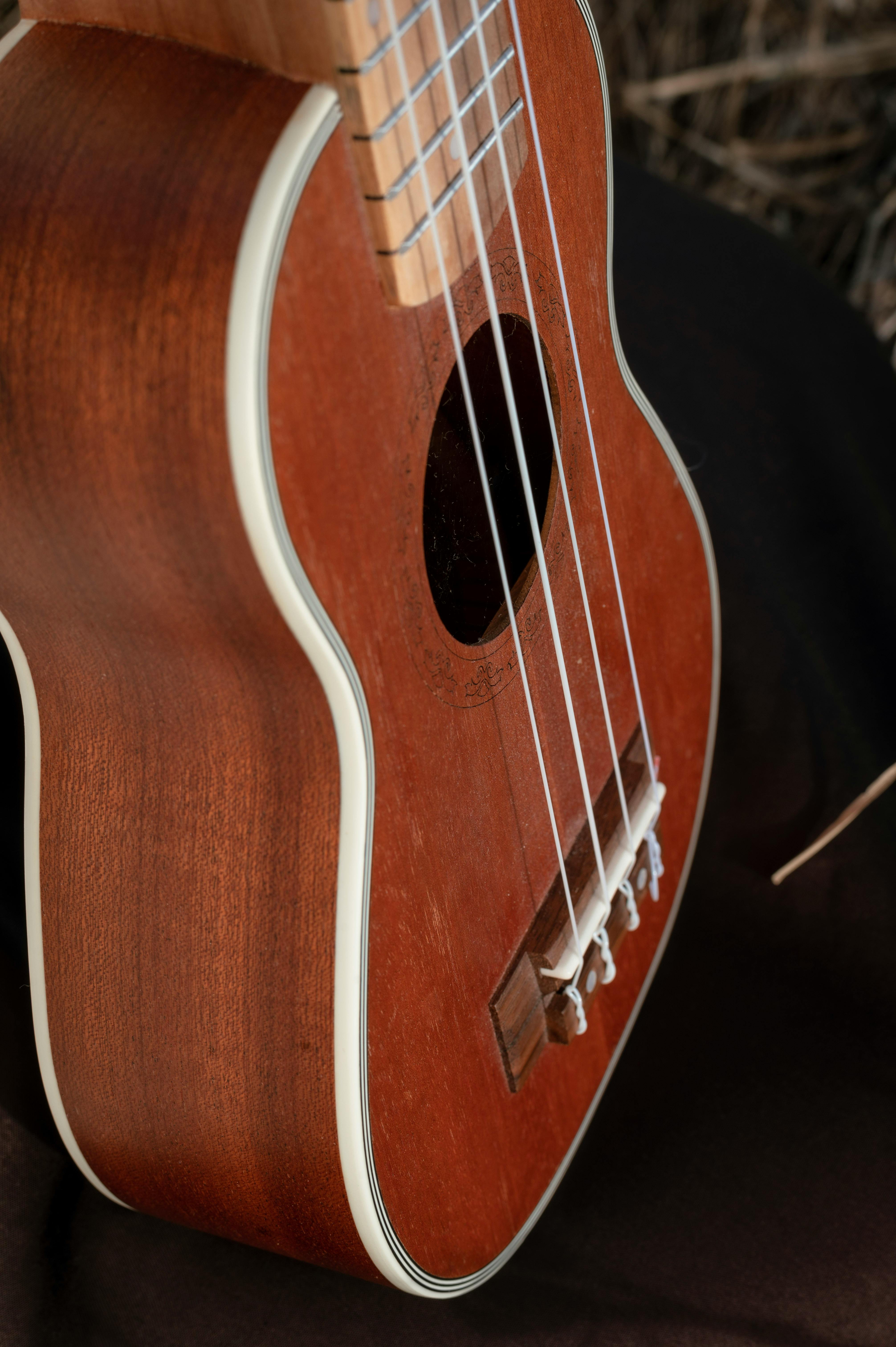 Close-Up Photo of a Brown Wooden Ukulele · Free Stock Photo