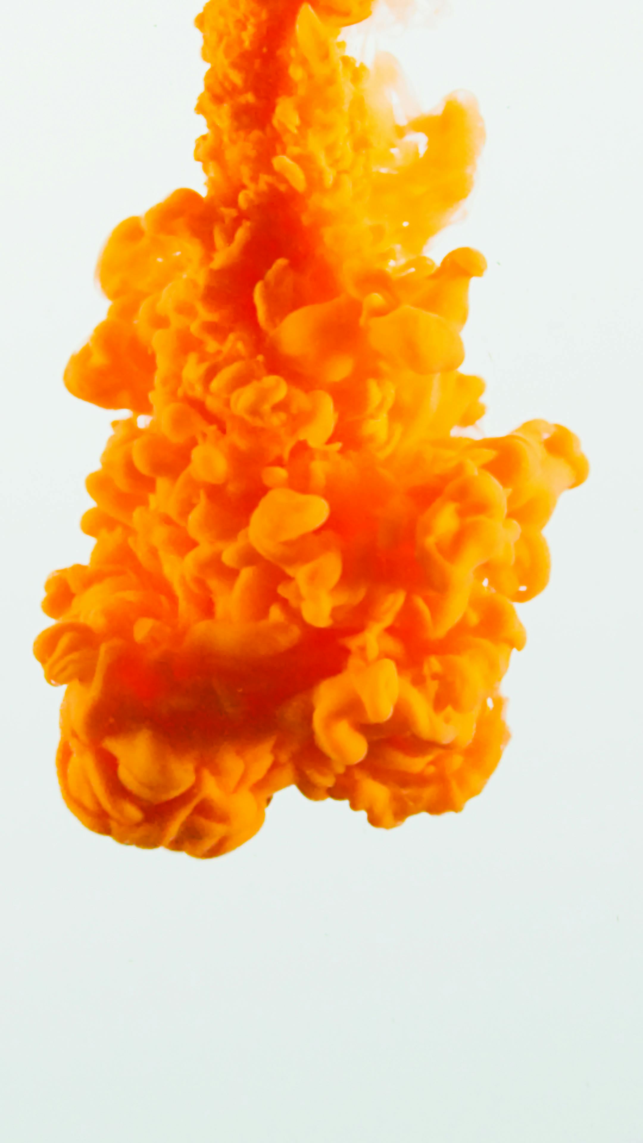 Orange Liquid Exploded in Water · Free Stock Photo