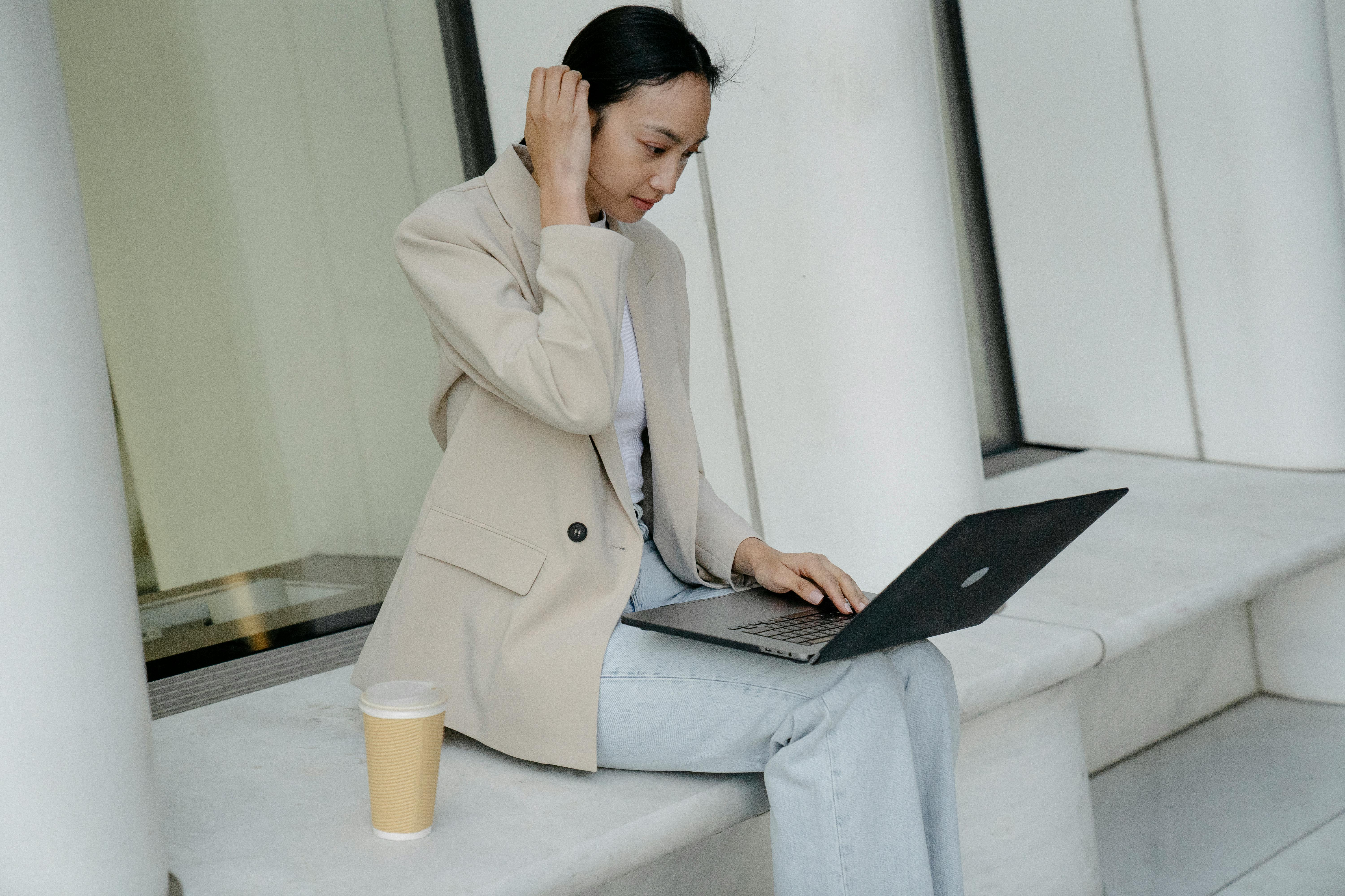 Businesswoman Using Laptop · Free Stock Photo