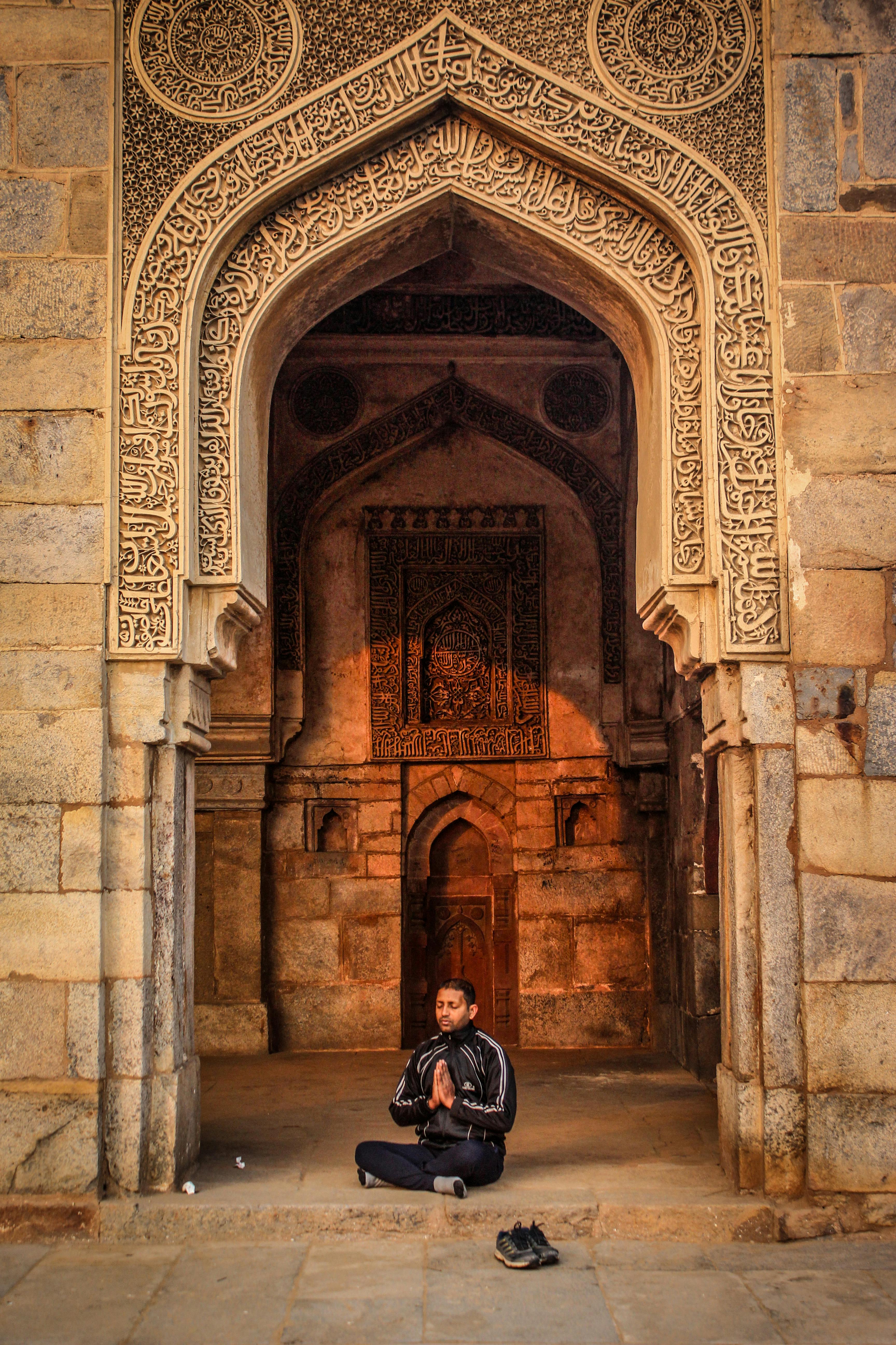 Man Praying at Temple · Free Stock Photo
