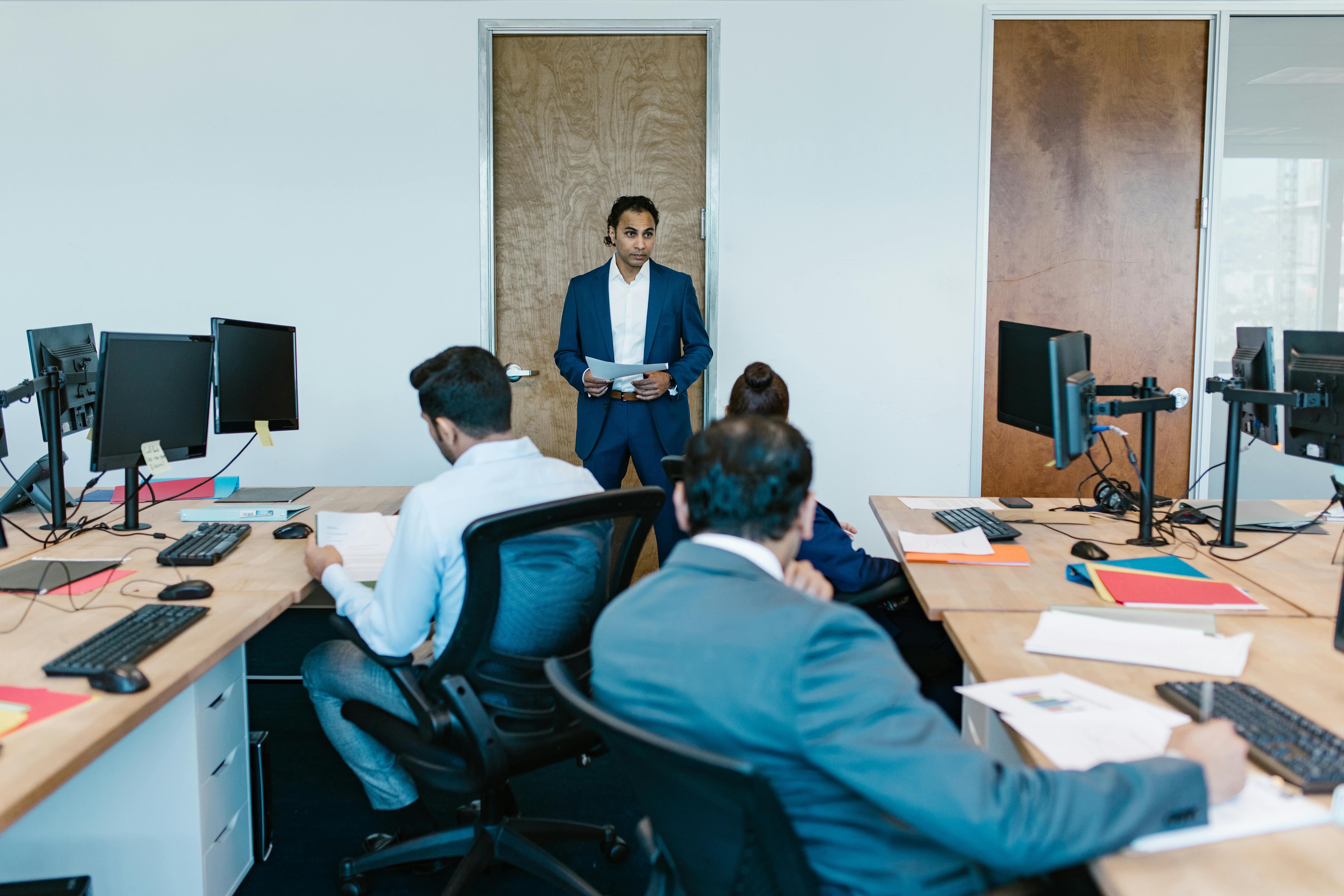 People Sitting on Swivel Chairs · Free Stock Photo