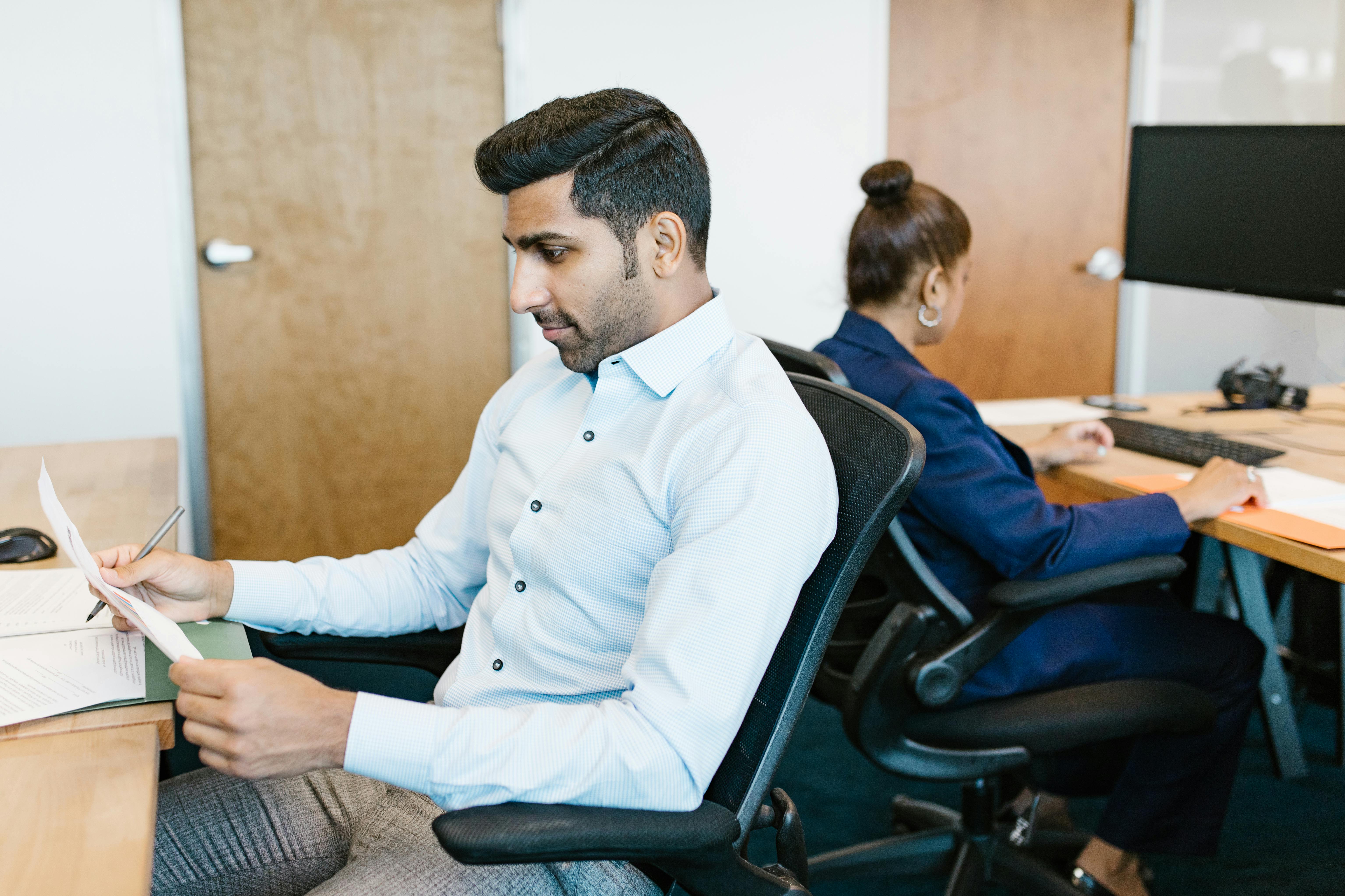 Boss Delegating Tasks to Employee · Free Stock Photo