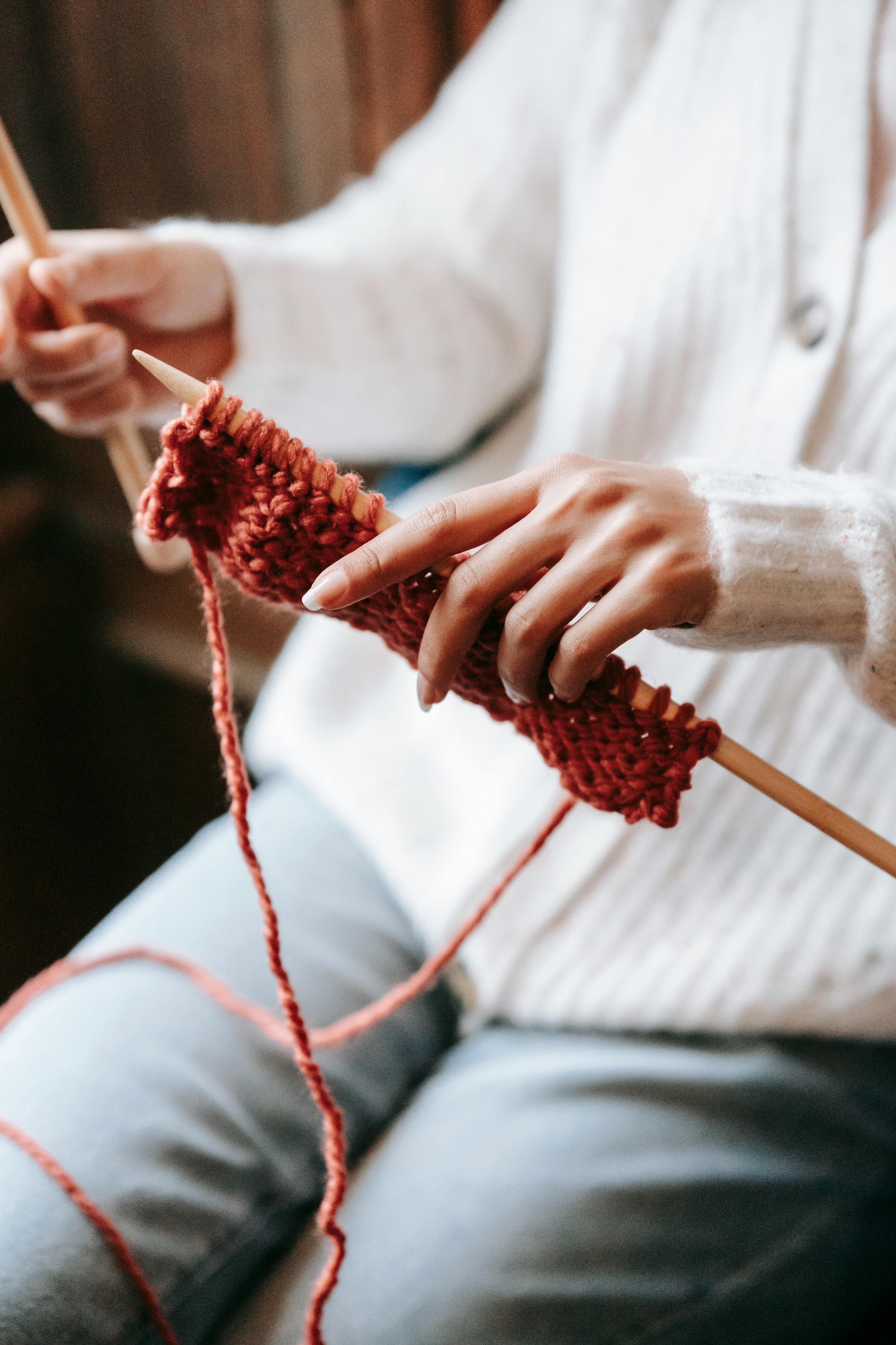 Person in White Knit Sweater Knitting · Free Stock Photo