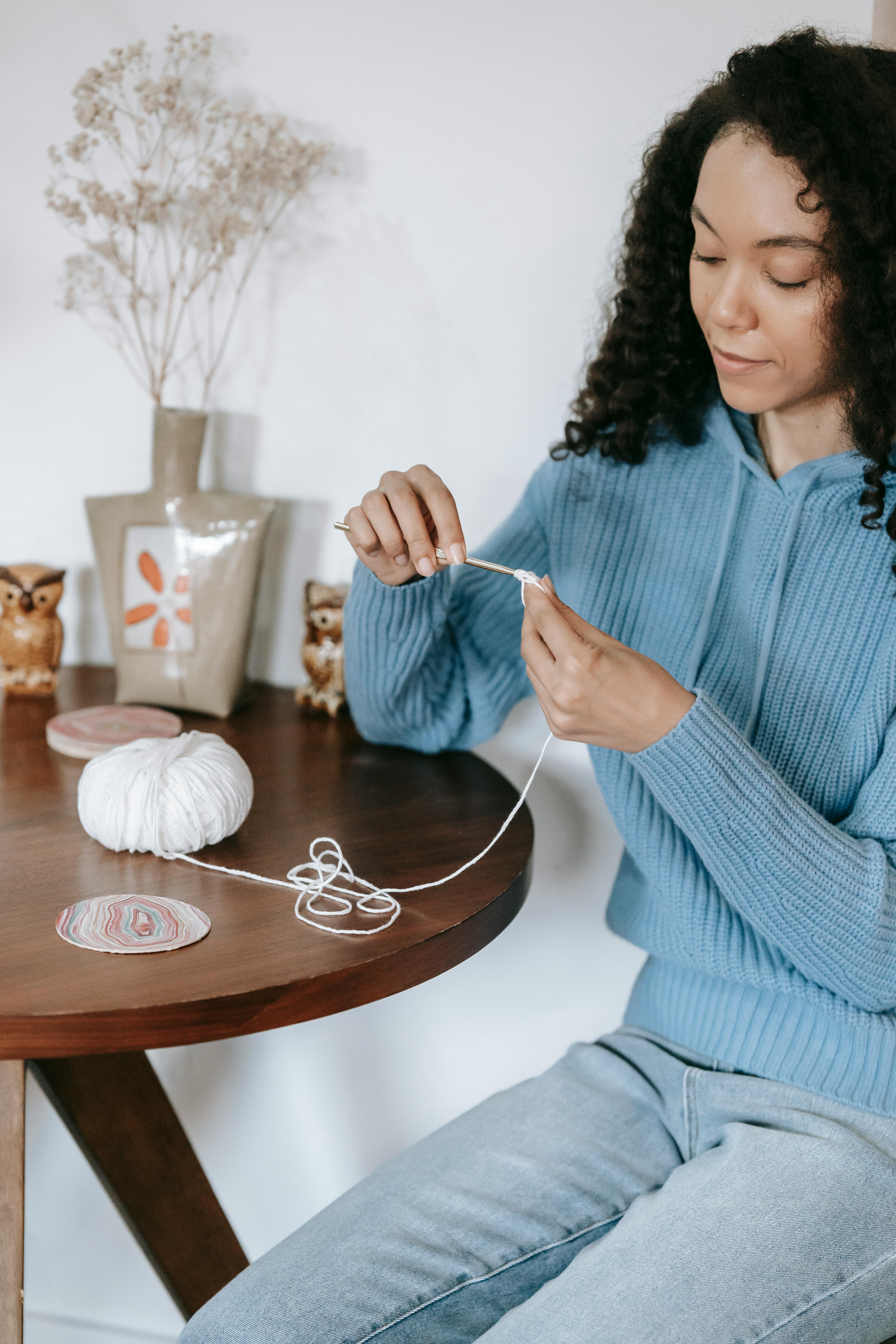 Person Holding Crochet Hook · Free Stock Photo