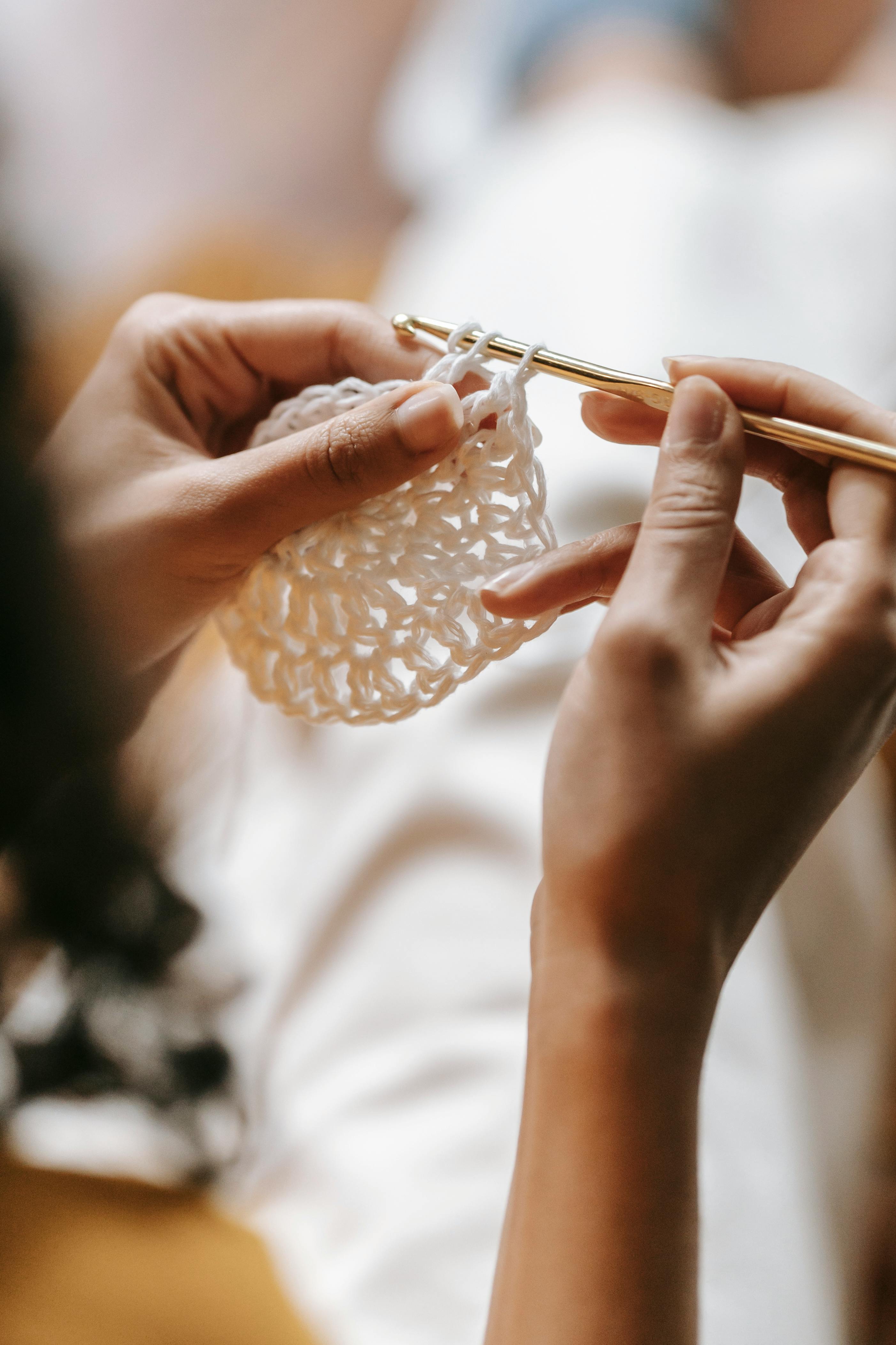 Close-up of a Woman Knitting · Free Stock Photo