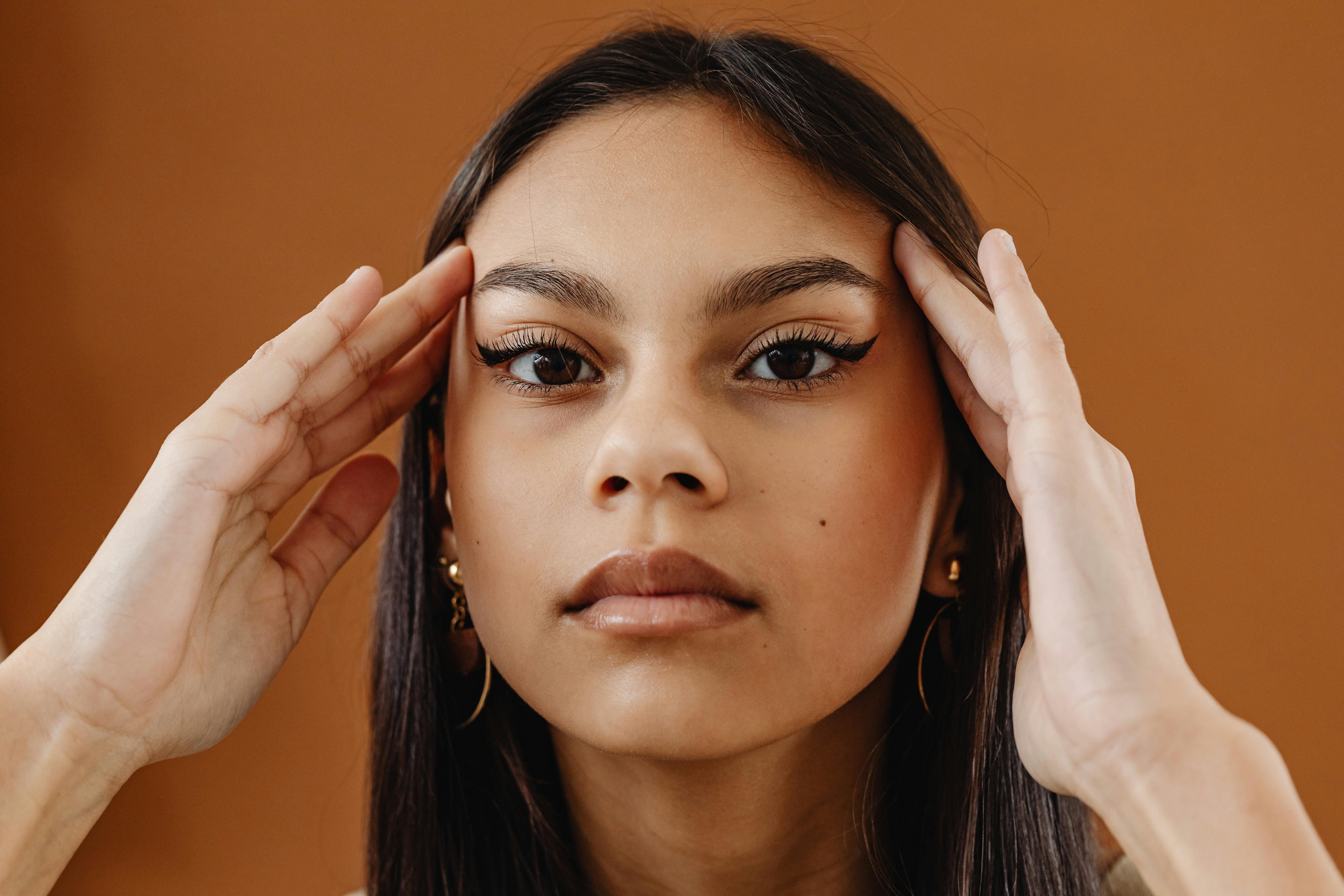 A Pretty Woman with Cat eye Makeup · Free Stock Photo