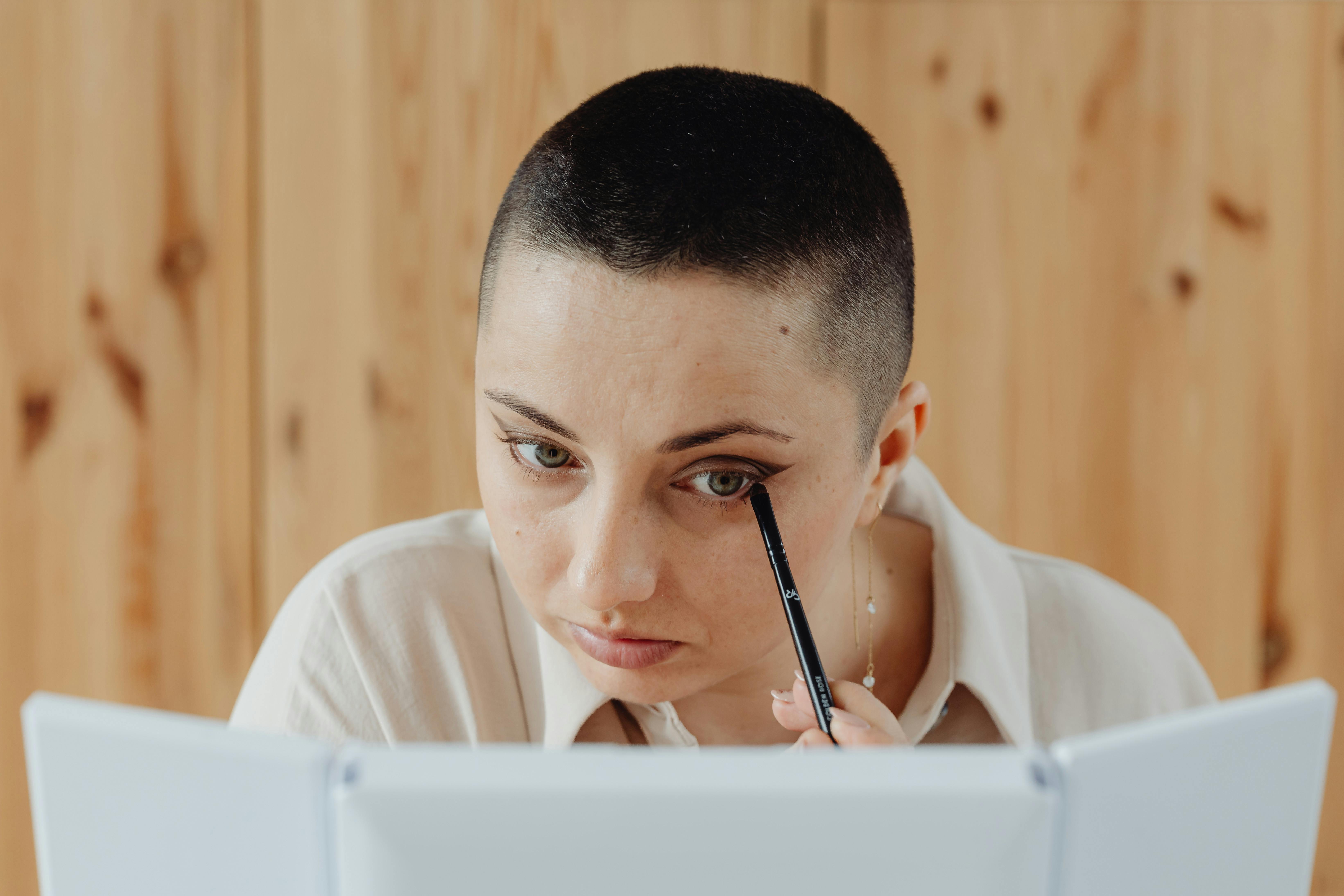Woman Doing Makeup · Free Stock Photo