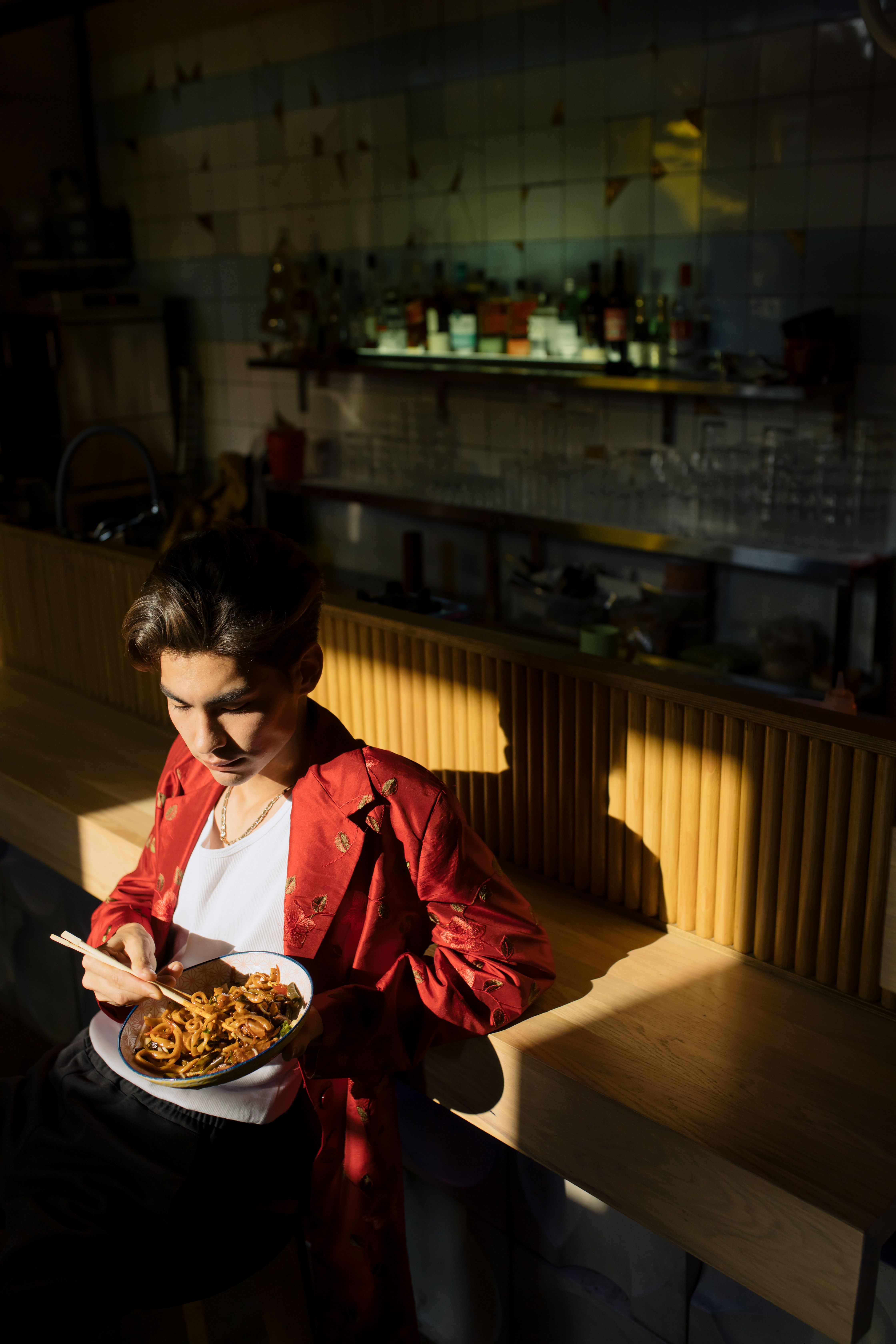 Man Eating Bowl of Noodles · Free Stock Photo