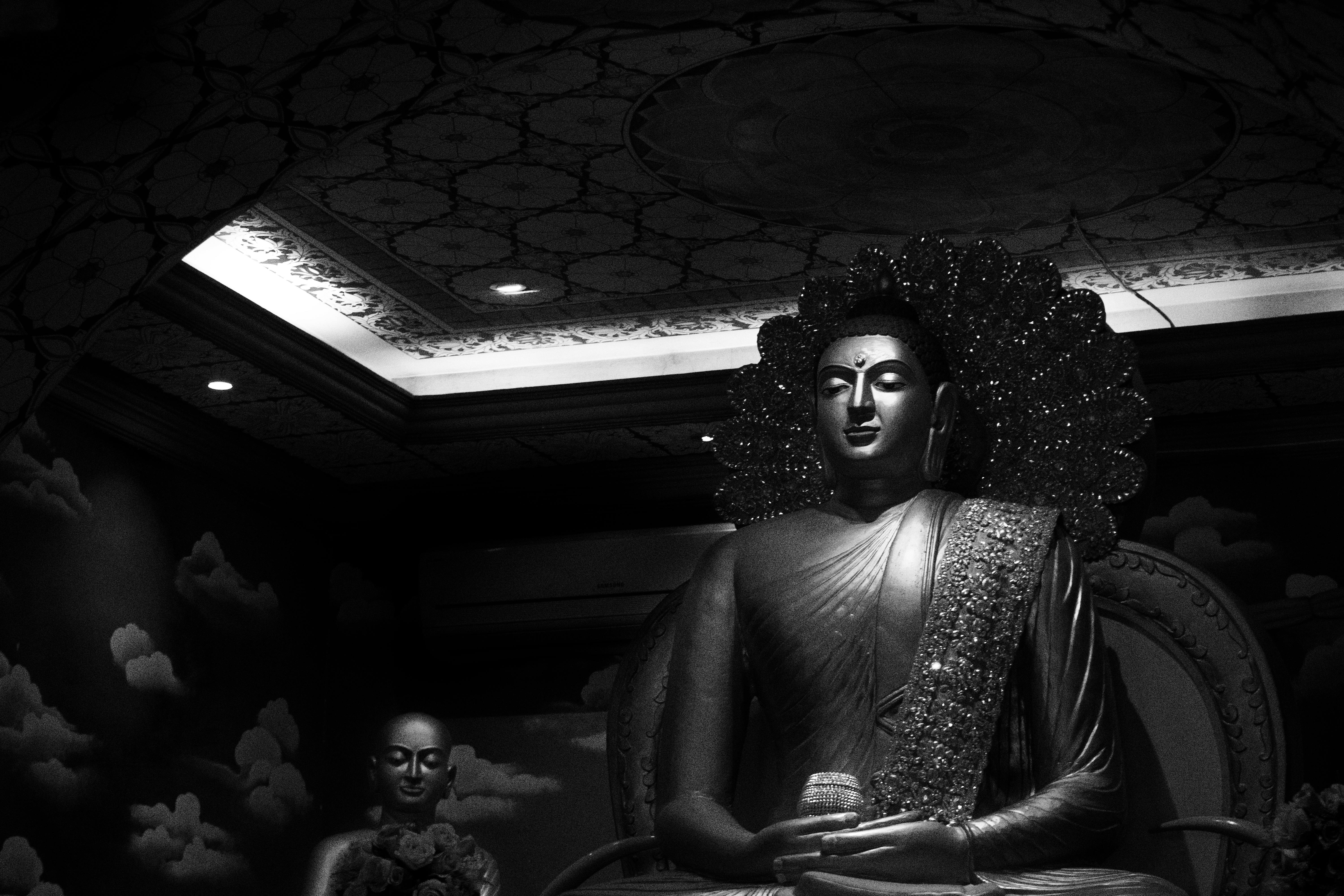 Grayscale Photo of Buddha Statue · Free Stock Photo