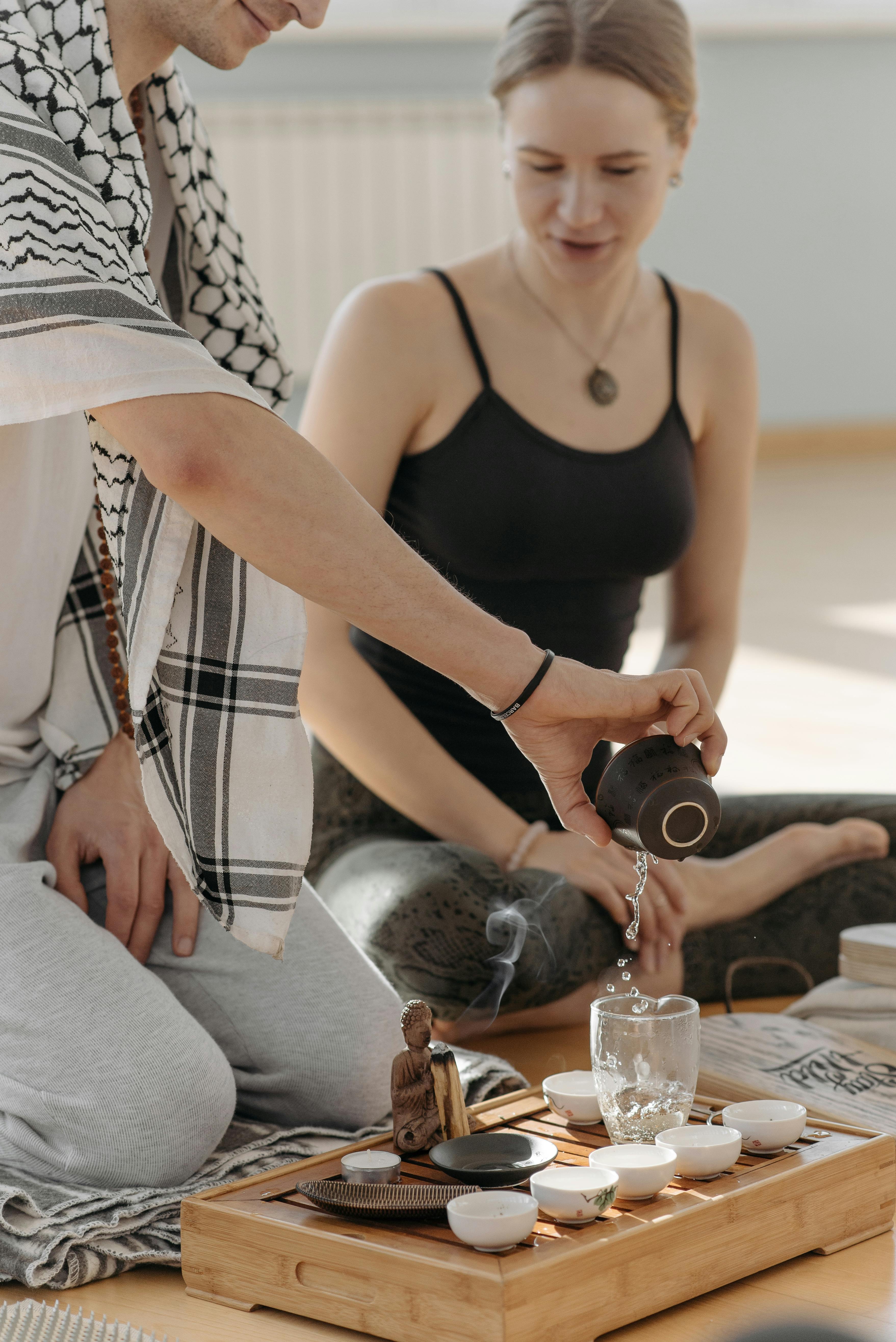 Man Preparing Tea in Traditional Way · Free Stock Photo