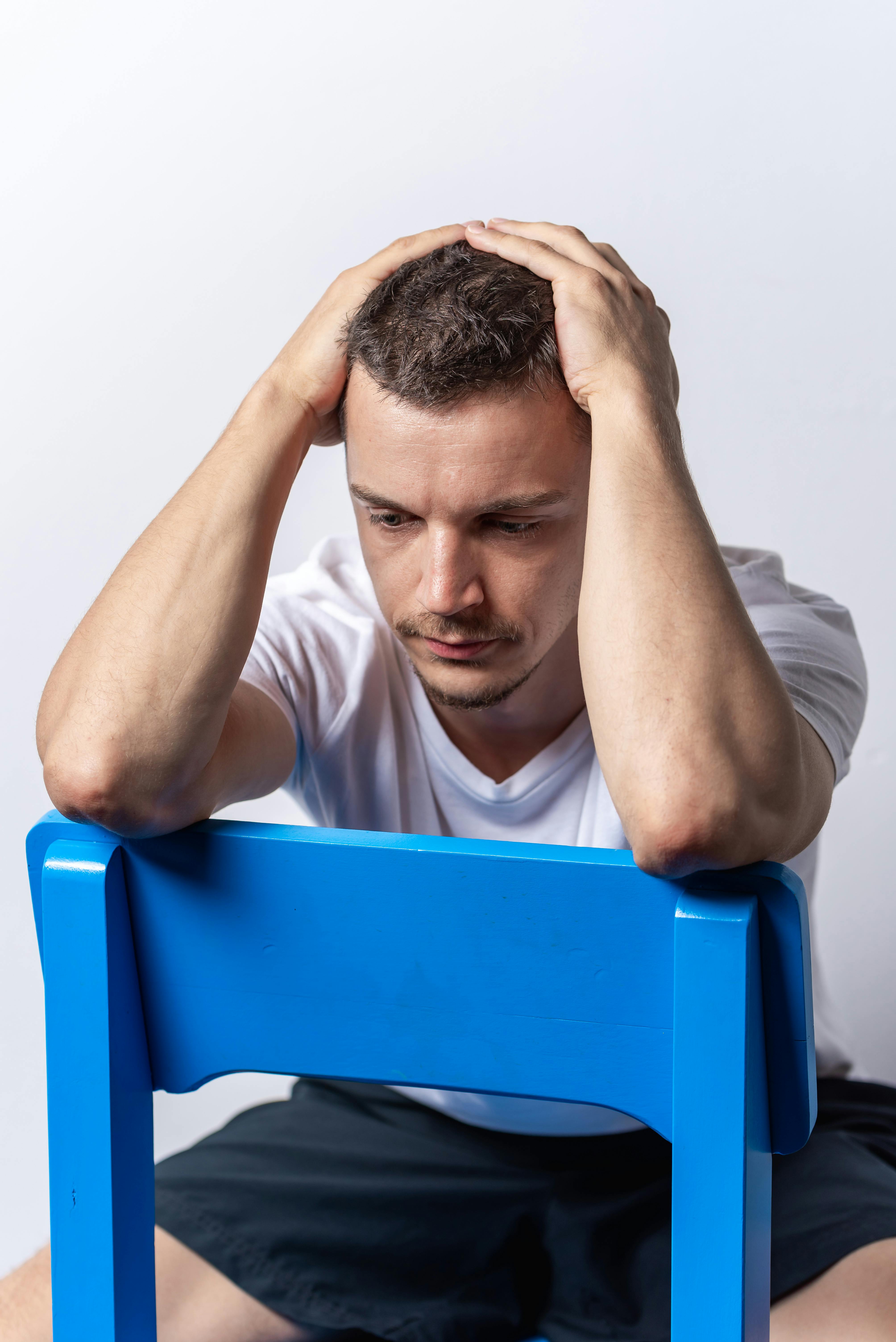 Overthinking Man Sitting On A Chair Photos, Download The BEST Free ...