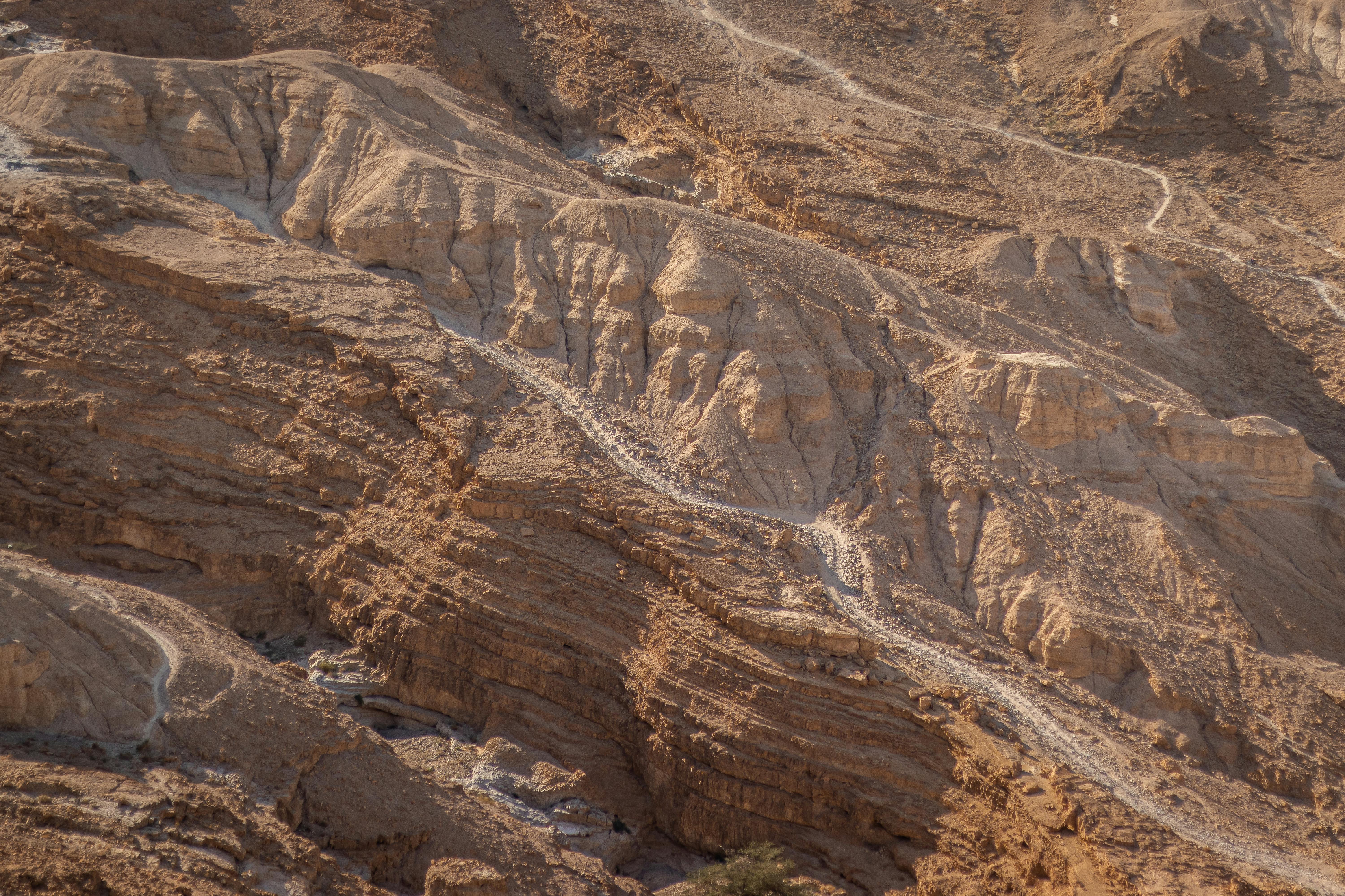Rocky terrain with narrow curvy road · Free Stock Photo