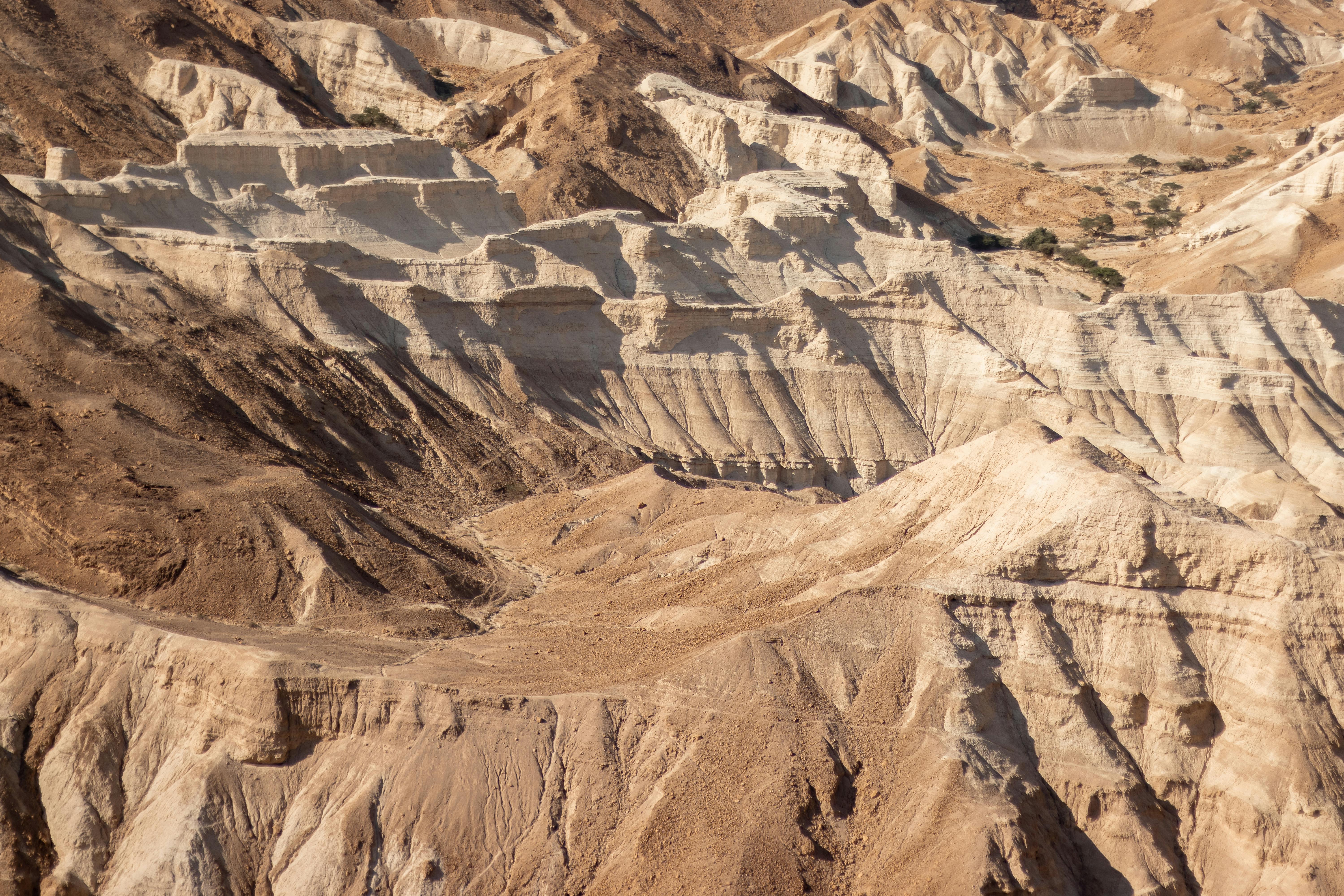 Rough uneven surface of rocky slope of mountain · Free Stock Photo