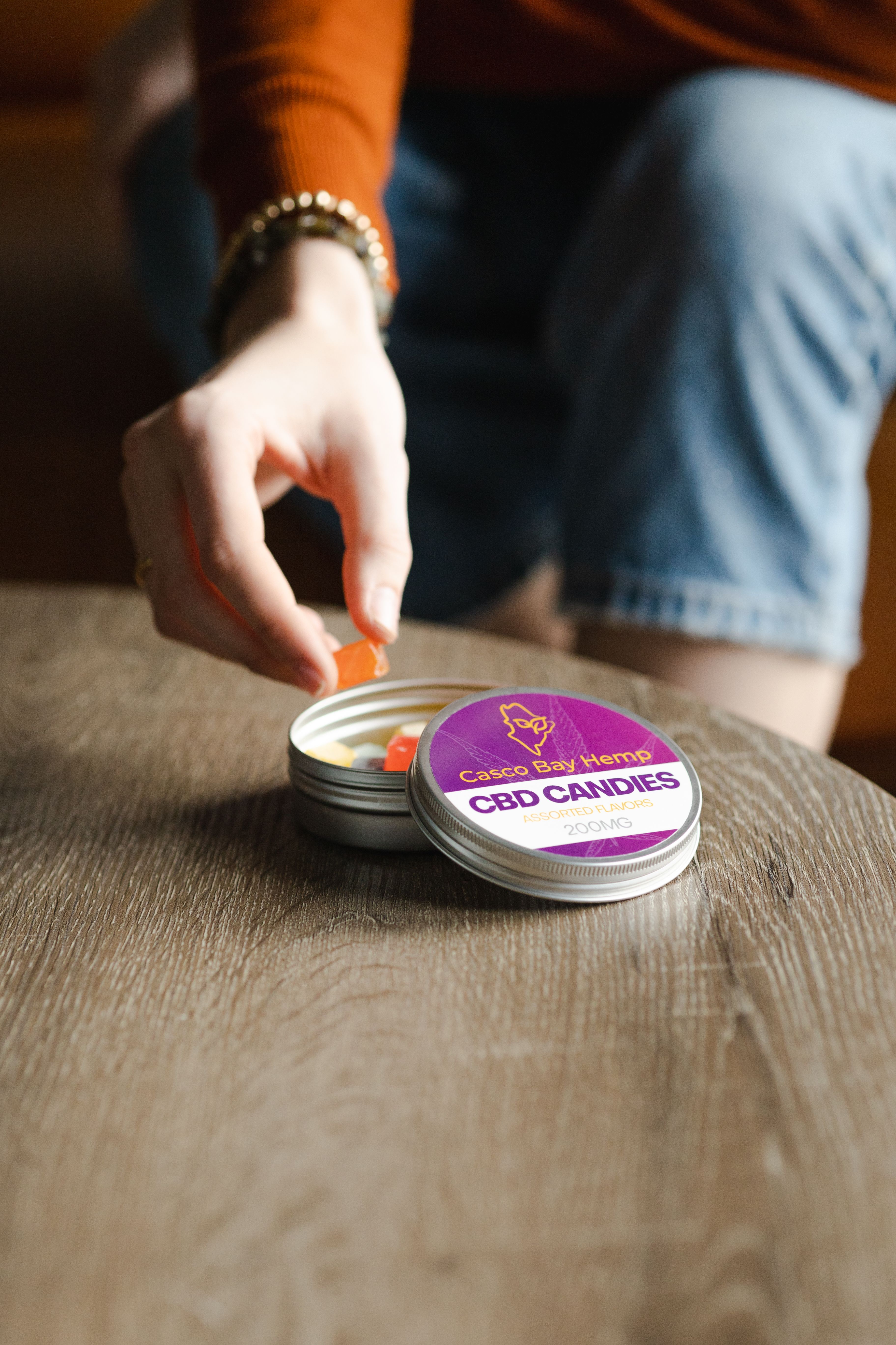 A Person Holding a Can of Gummy Candy · Free Stock Photo