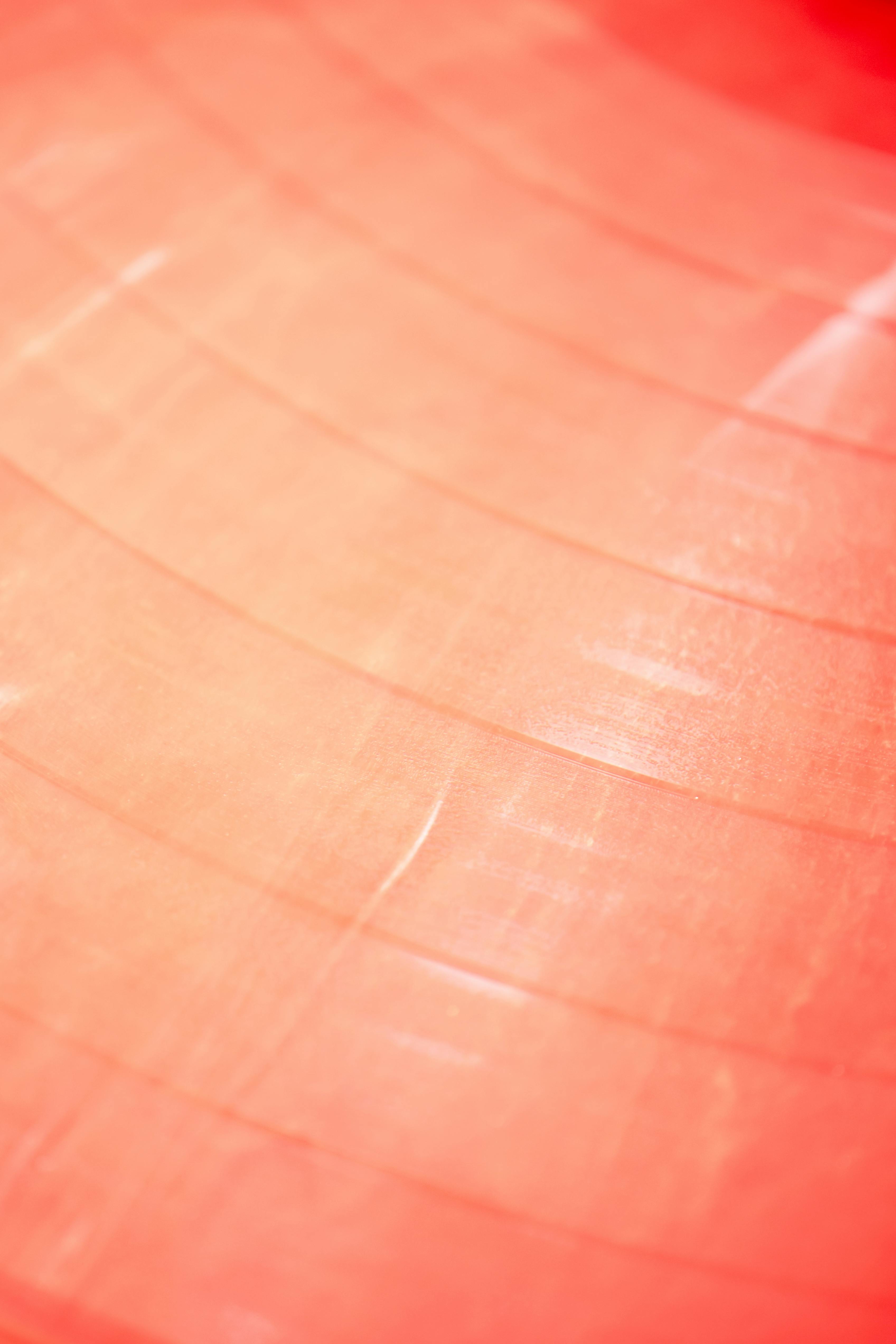 A Close-up Photo of an Orange Vinyl Record · Free Stock Photo