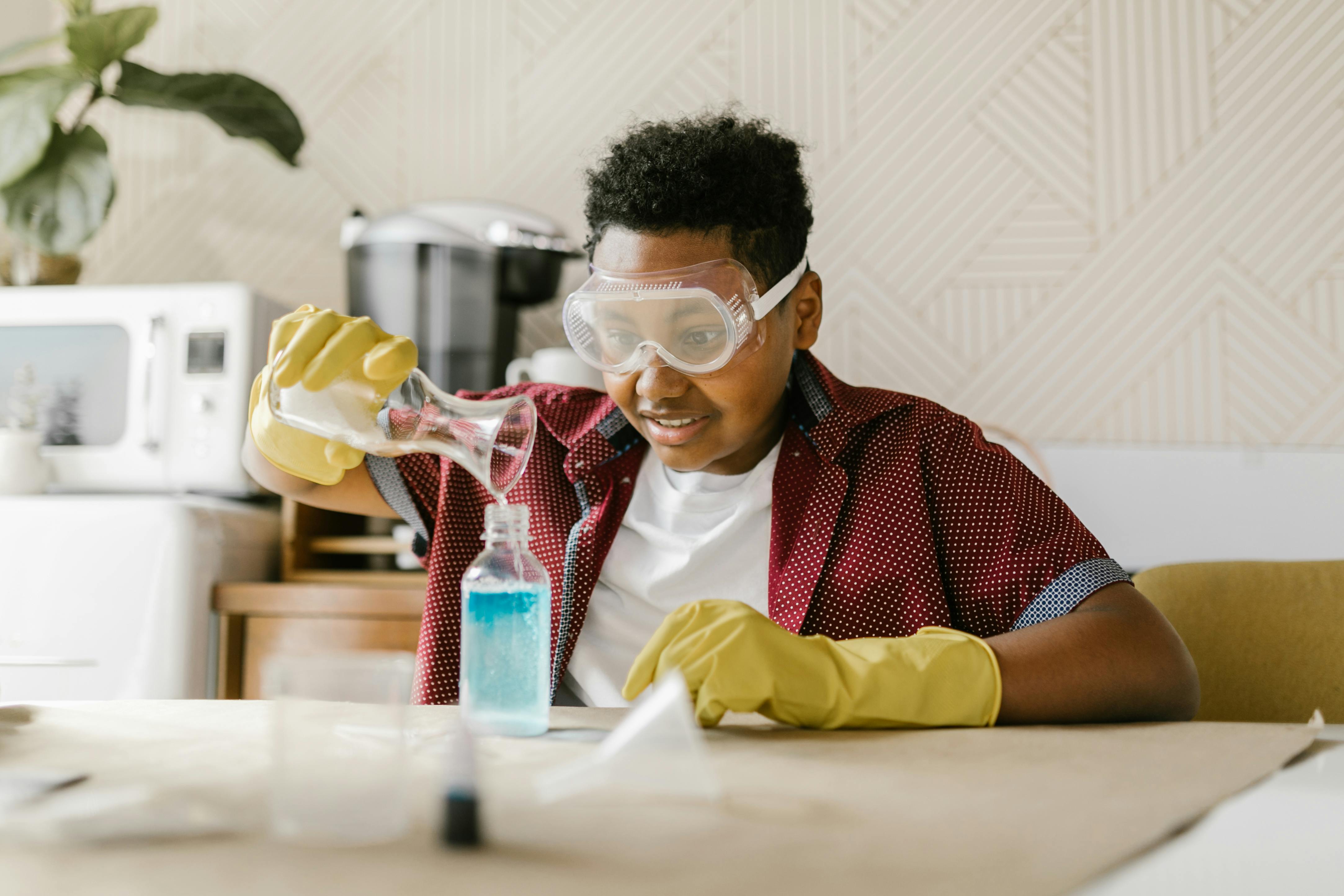A Boy Doing a Home Experiment · Free Stock Photo