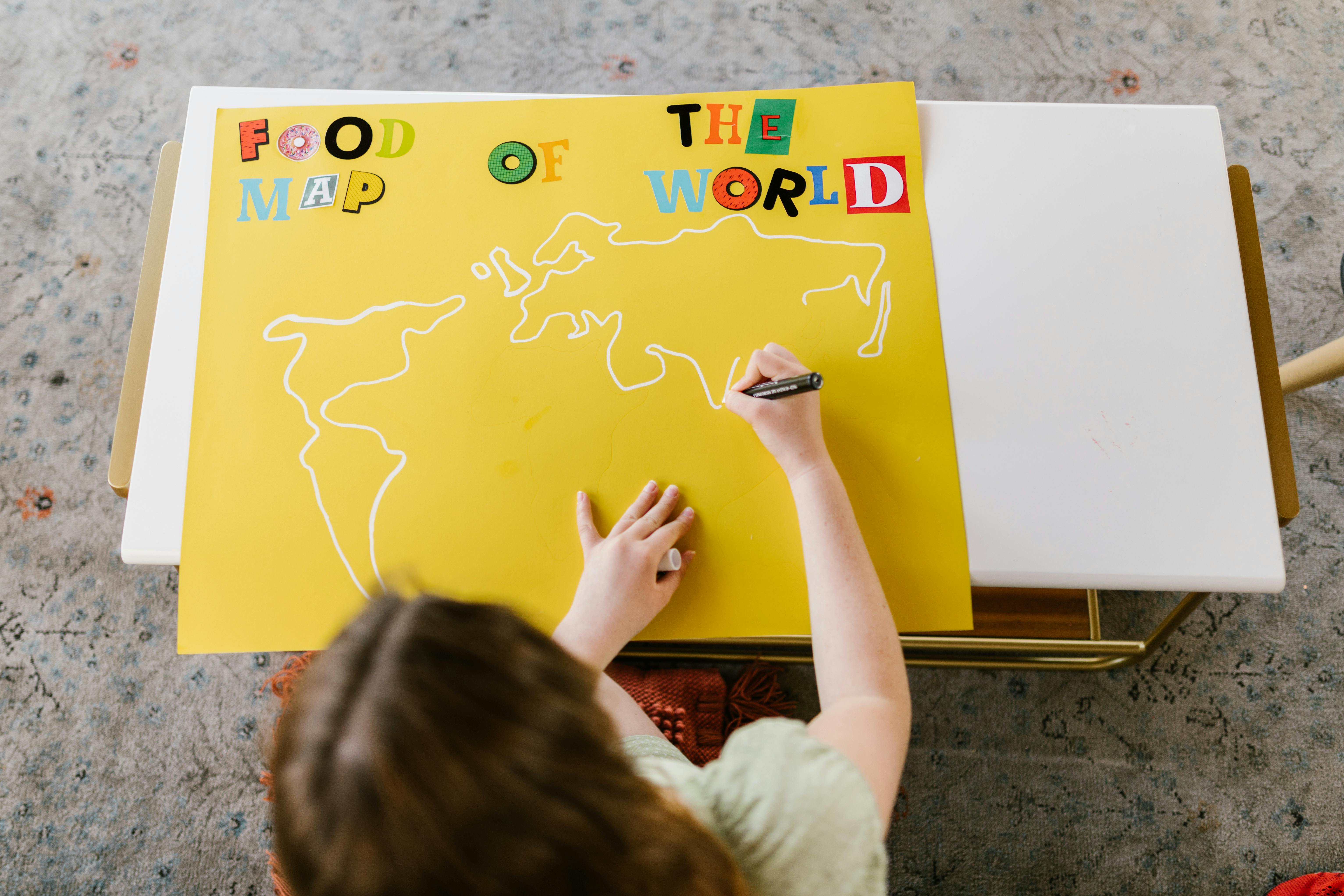 Little Girl Making a Poster · Free Stock Photo