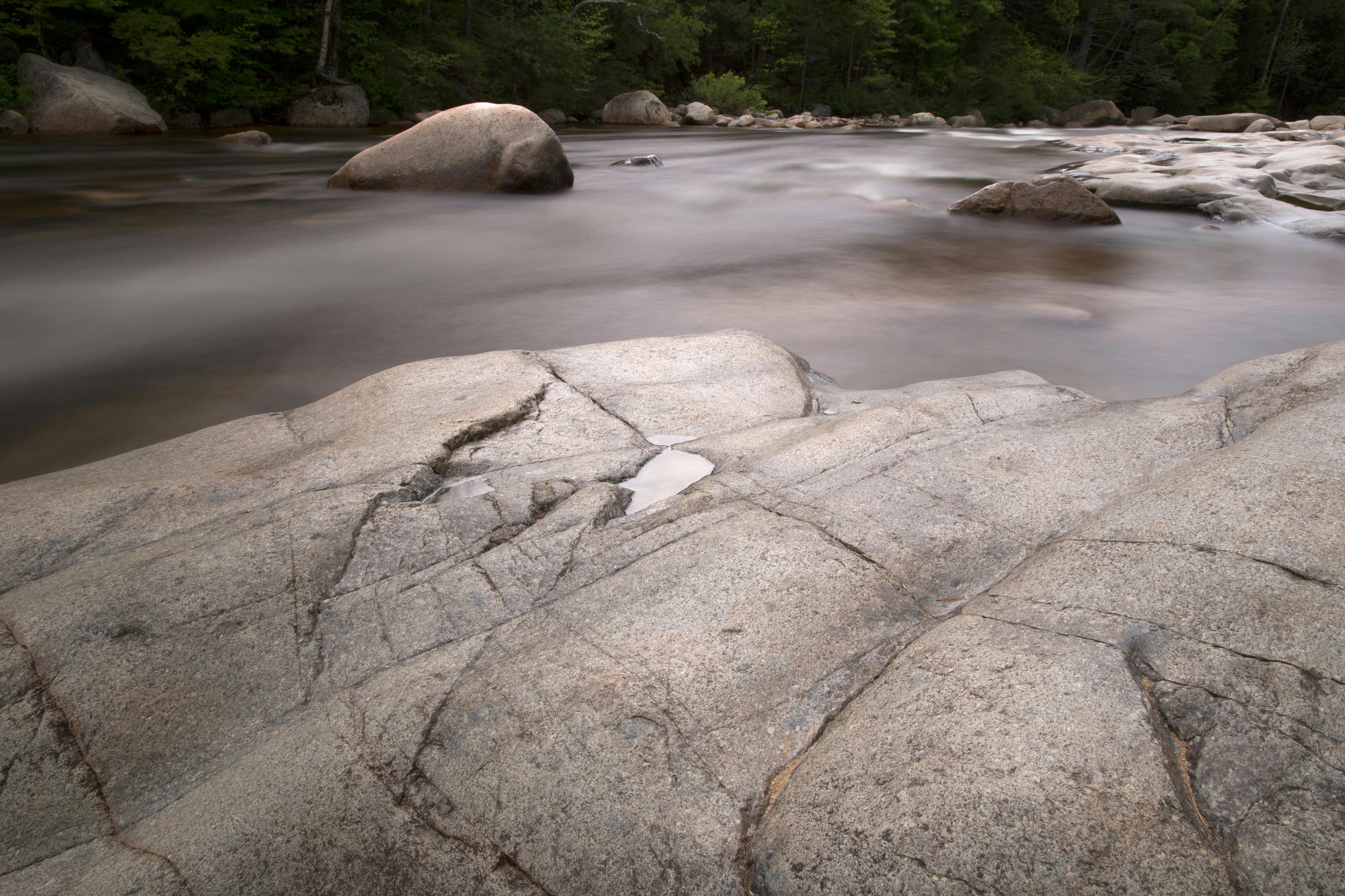 Photo of Body of Water Surrounded by Rock Formation · Free Stock Photo