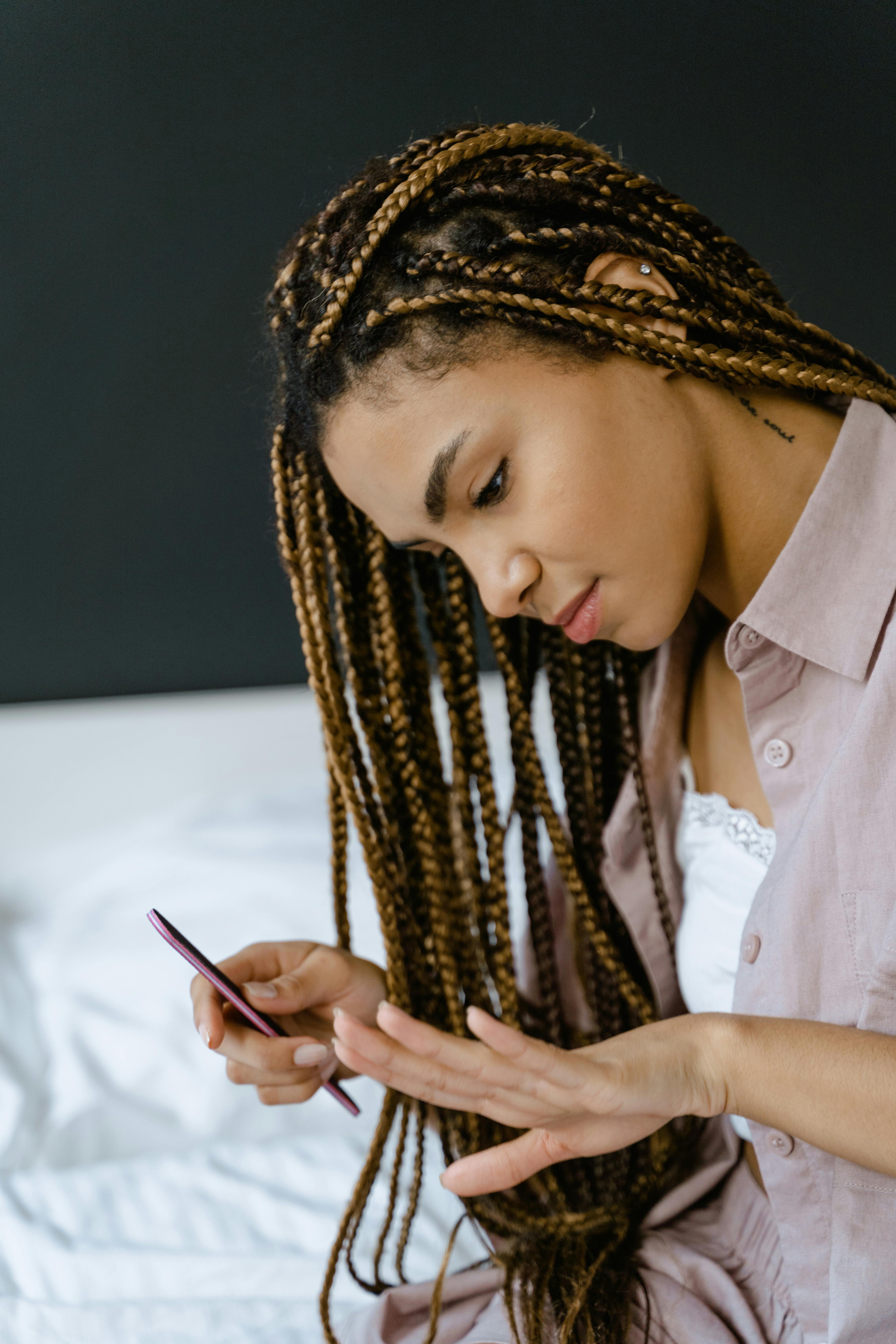 Person Braiding a Woman's Hair · Free Stock Photo