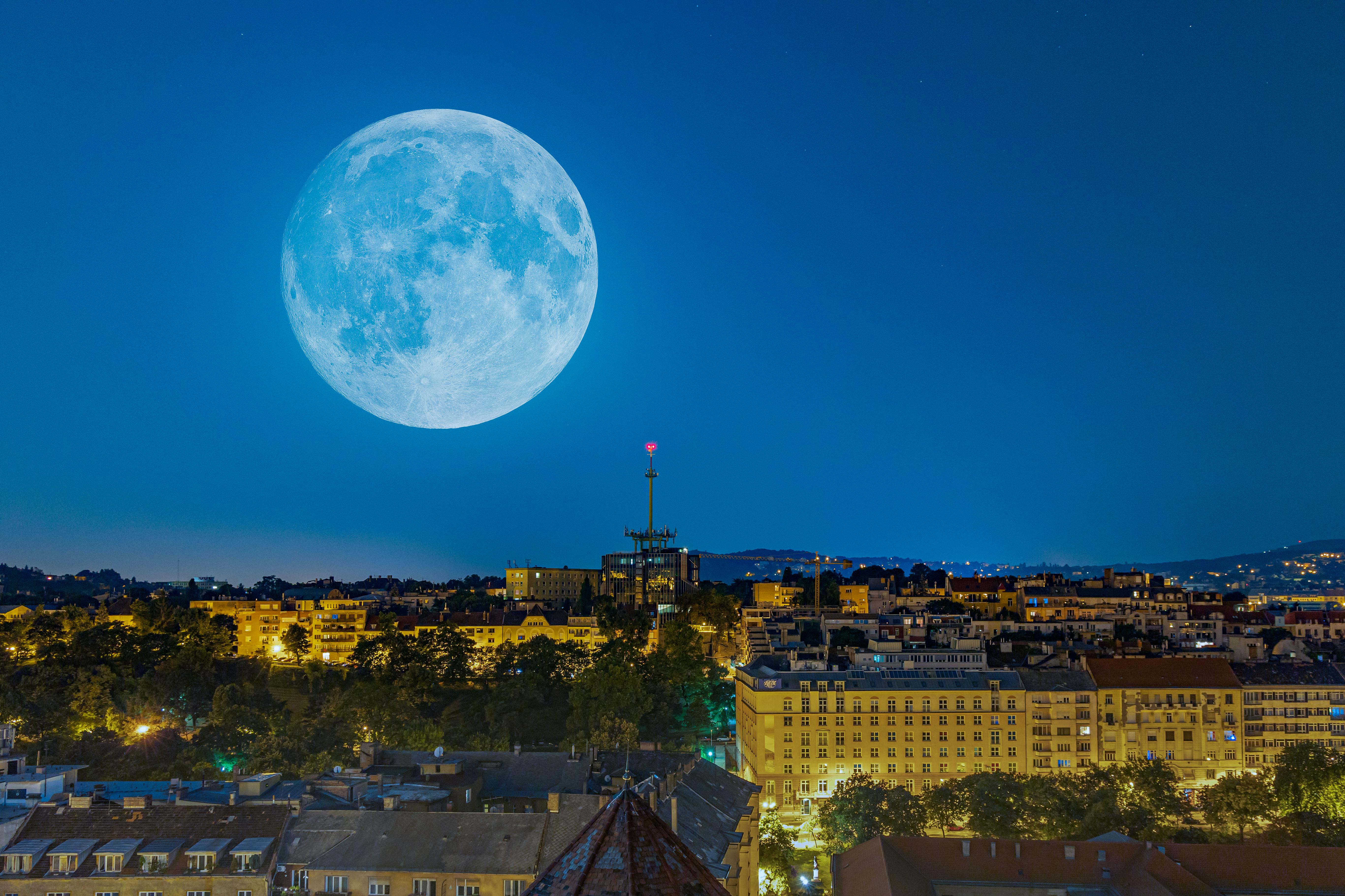Big moon over city at night · Free Stock Photo