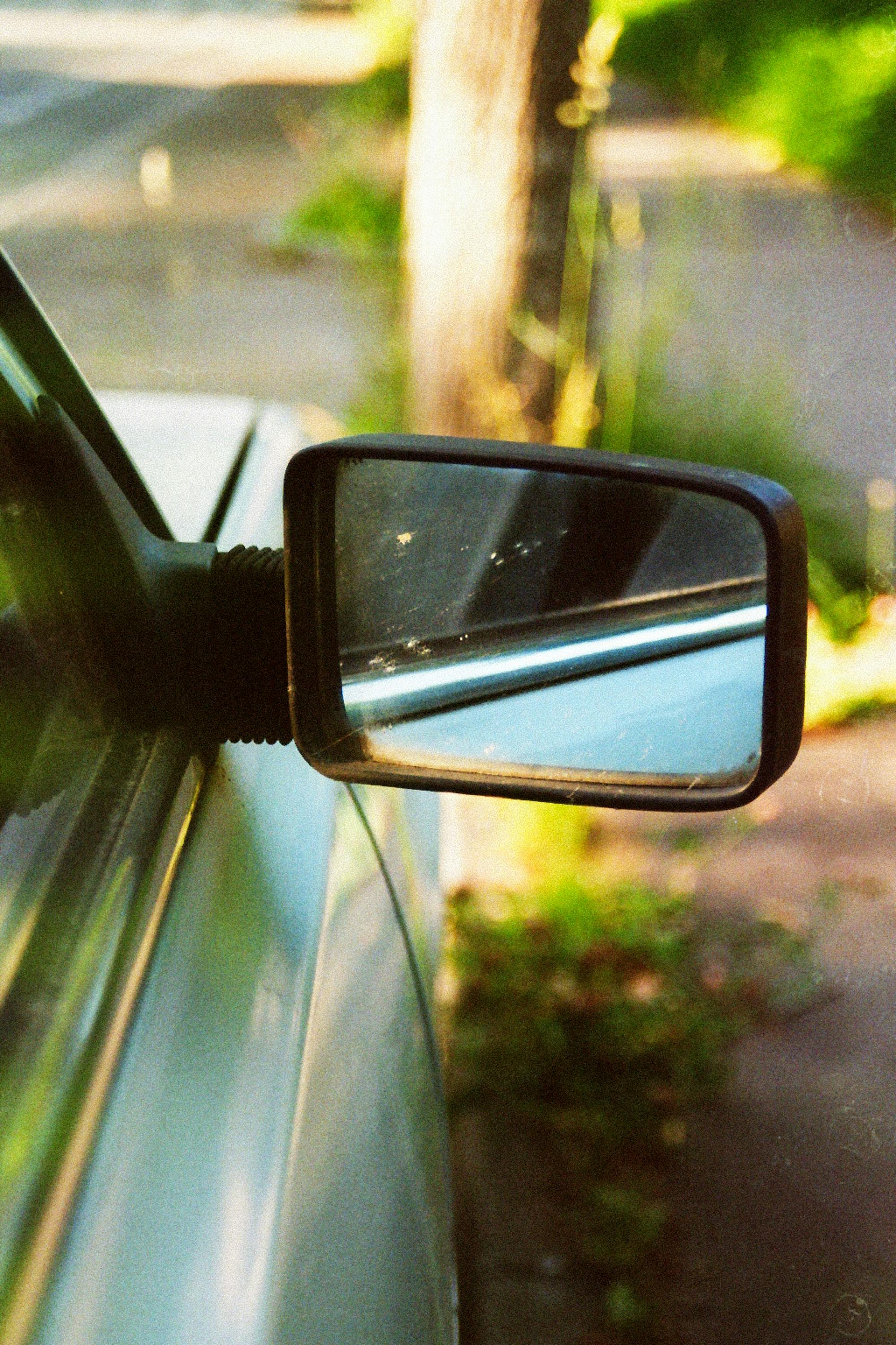 Close-Up Shot of a Broken Side Mirror · Free Stock Photo