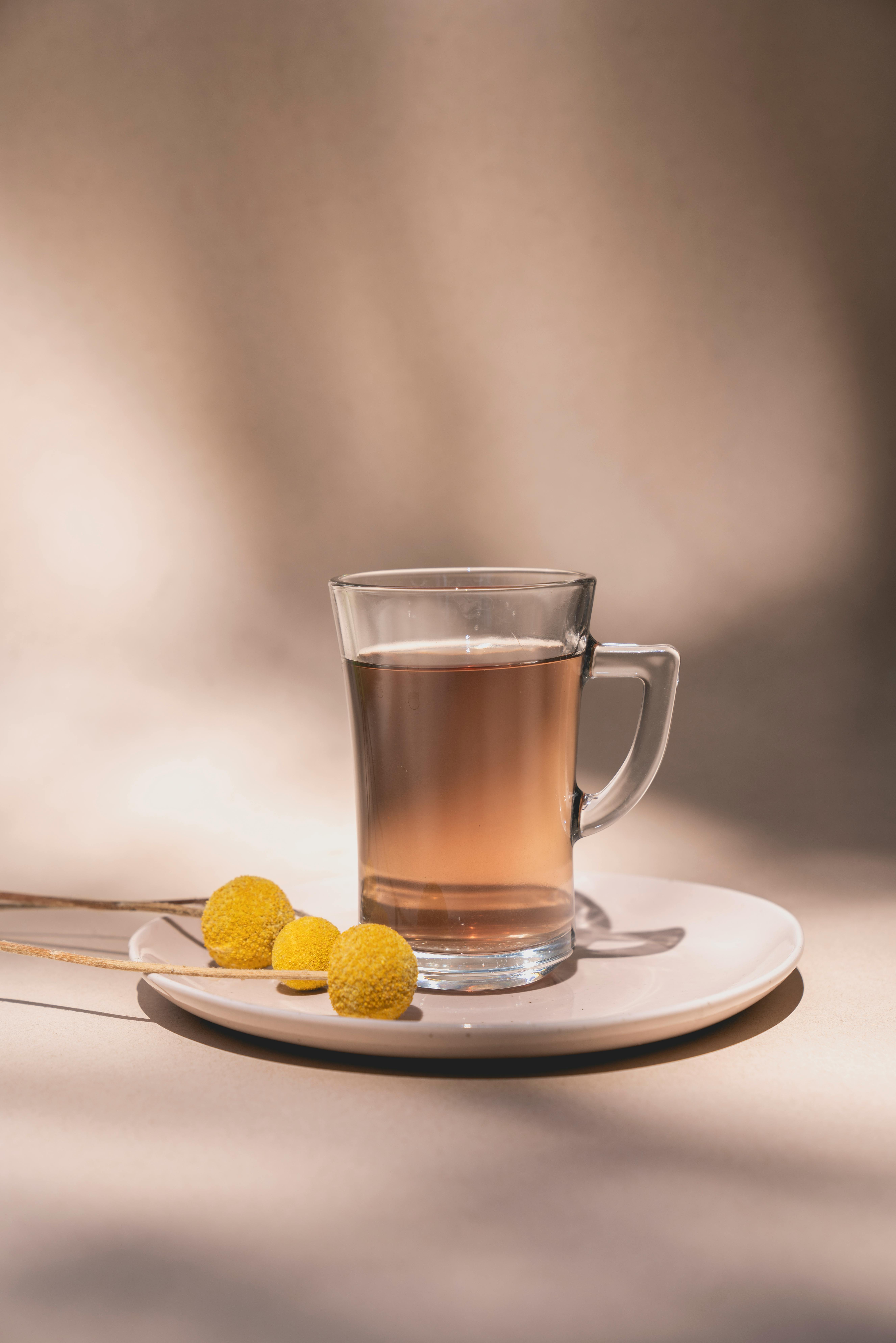 Clear Glass Mug on White Ceramic Plate · Free Stock Photo