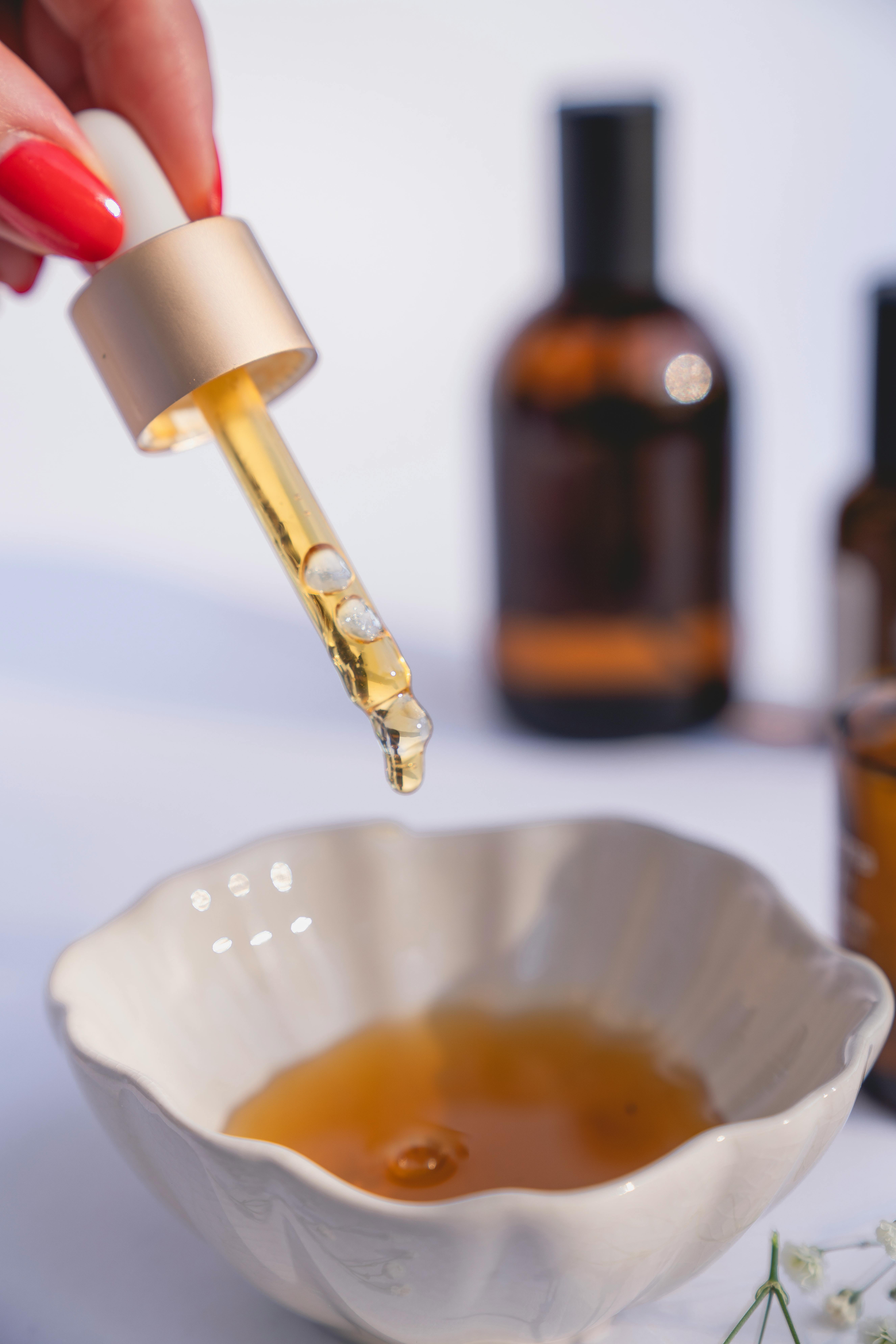 A Dropper with Liquid Inside · Free Stock Photo