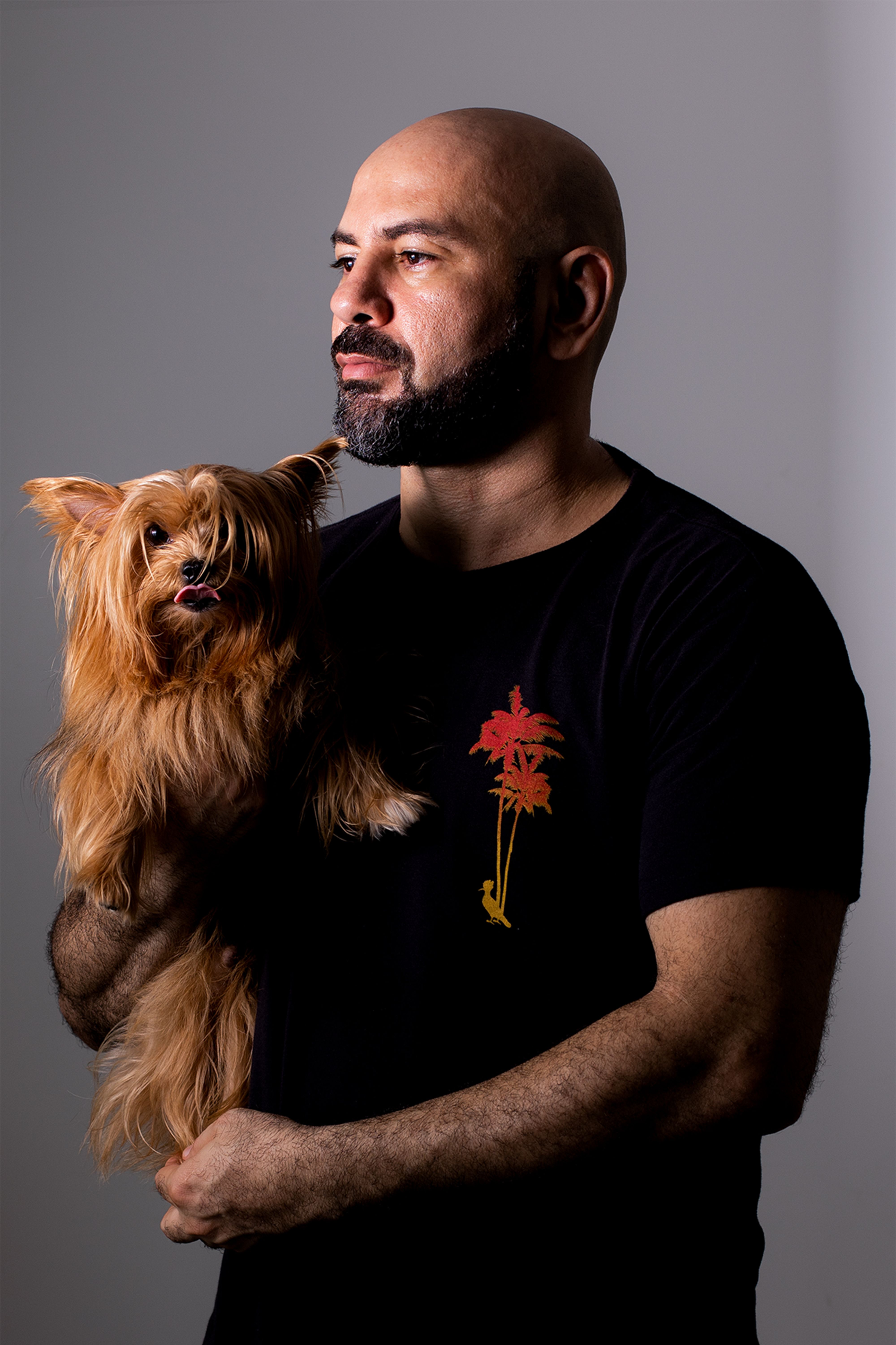 Man Carrying his Dog · Free Stock Photo