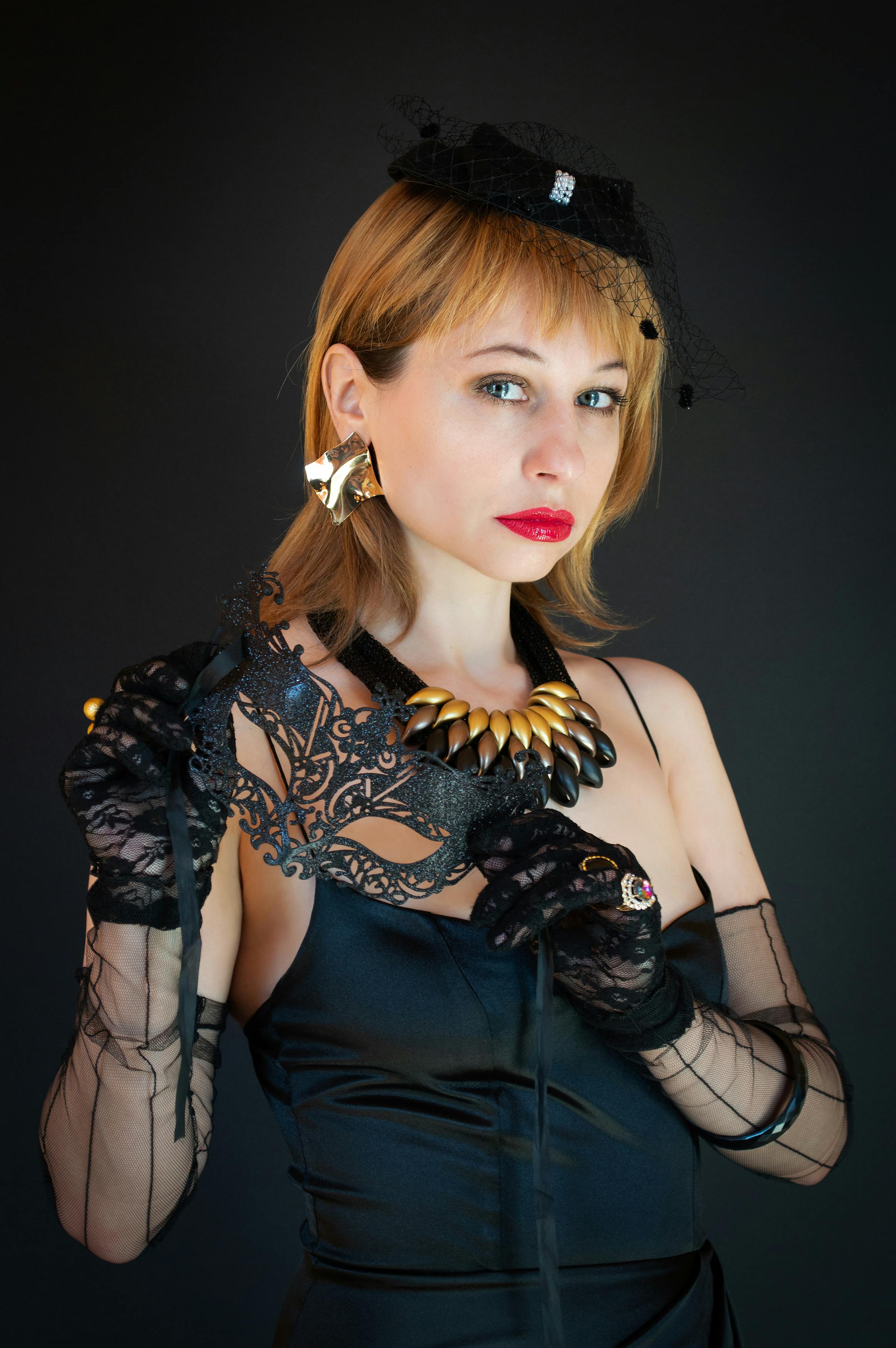 Woman covering face with masquerade mask · Free Stock Photo